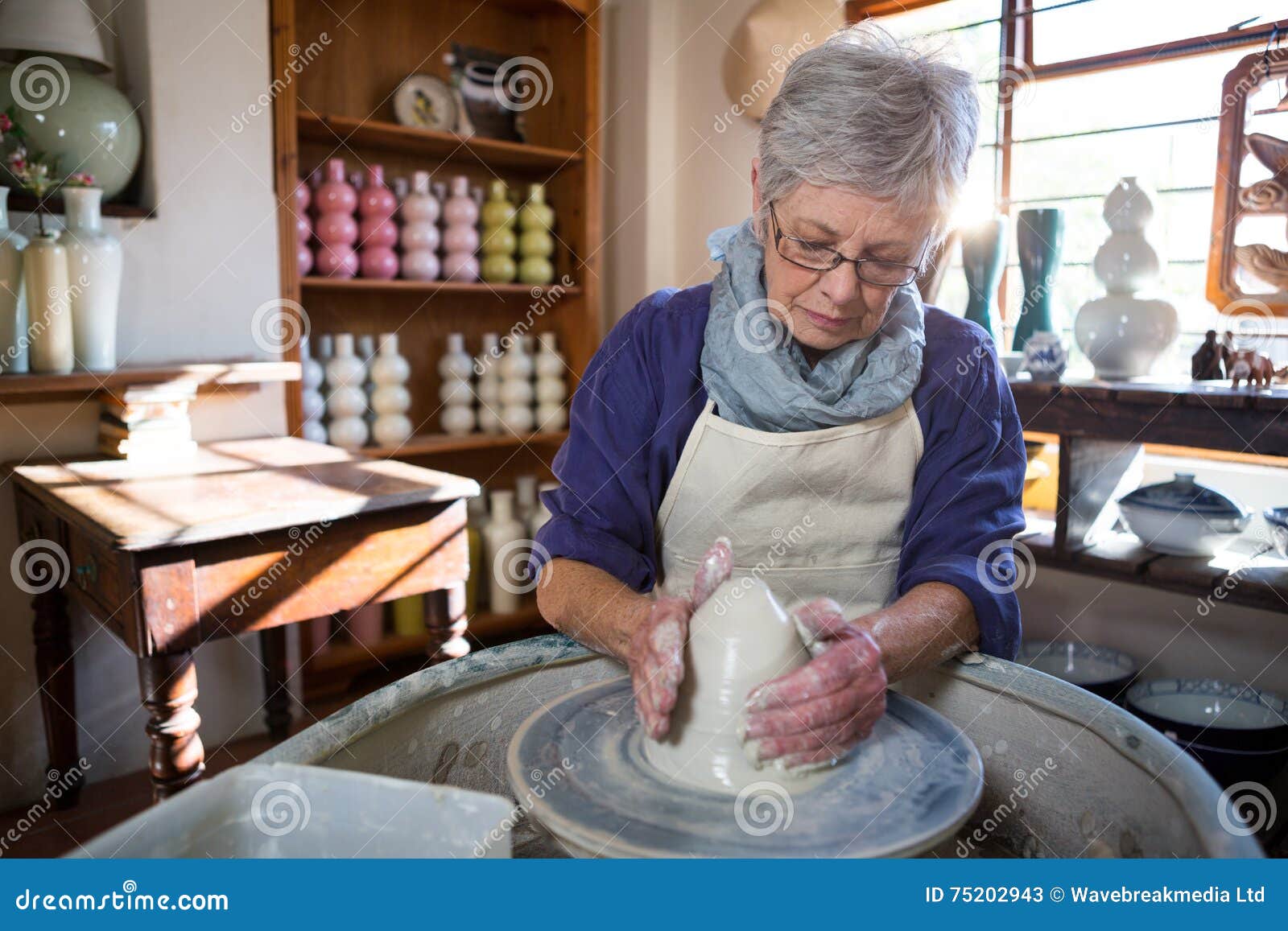 Female potter making pot stock image. Image of expertise - 75202943