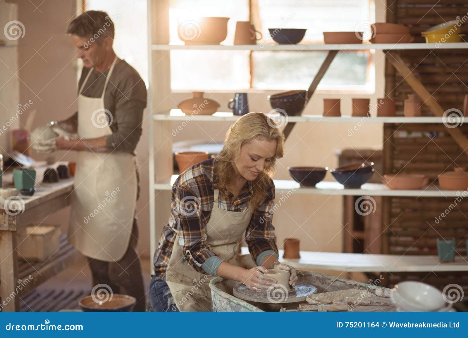 Female Potter Making Pot in Pottery Workshop Stock Photo - Image of ...