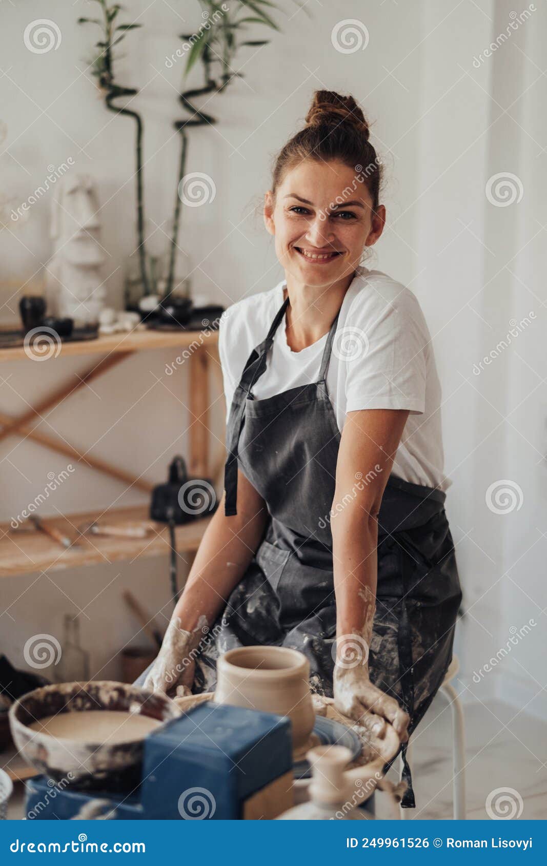Female Pottery Master at Work in Her Clay Studio, Young Entrepreneur ... Female Pottery Master at Work in Her Clay Studio, Young Entrepreneur ...