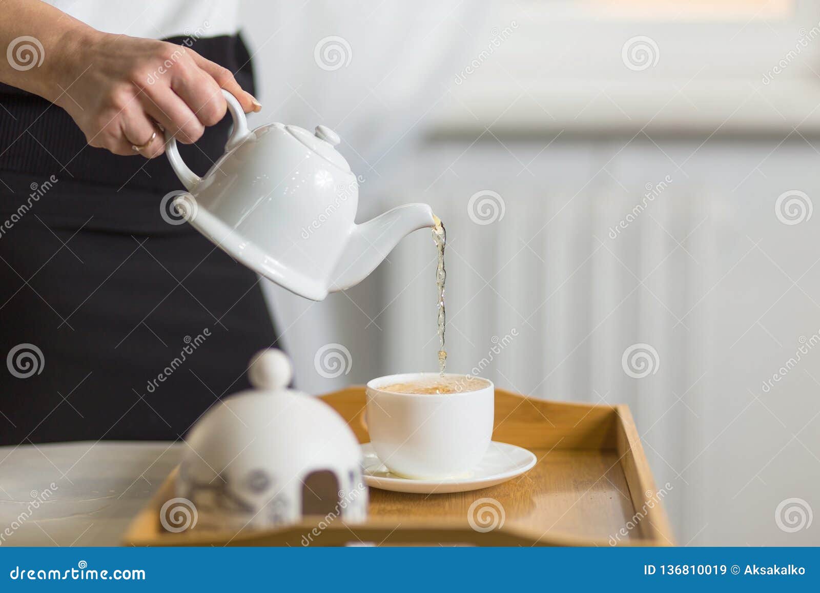 Female pouring tea stock image. Image of drink, concept - 136810019