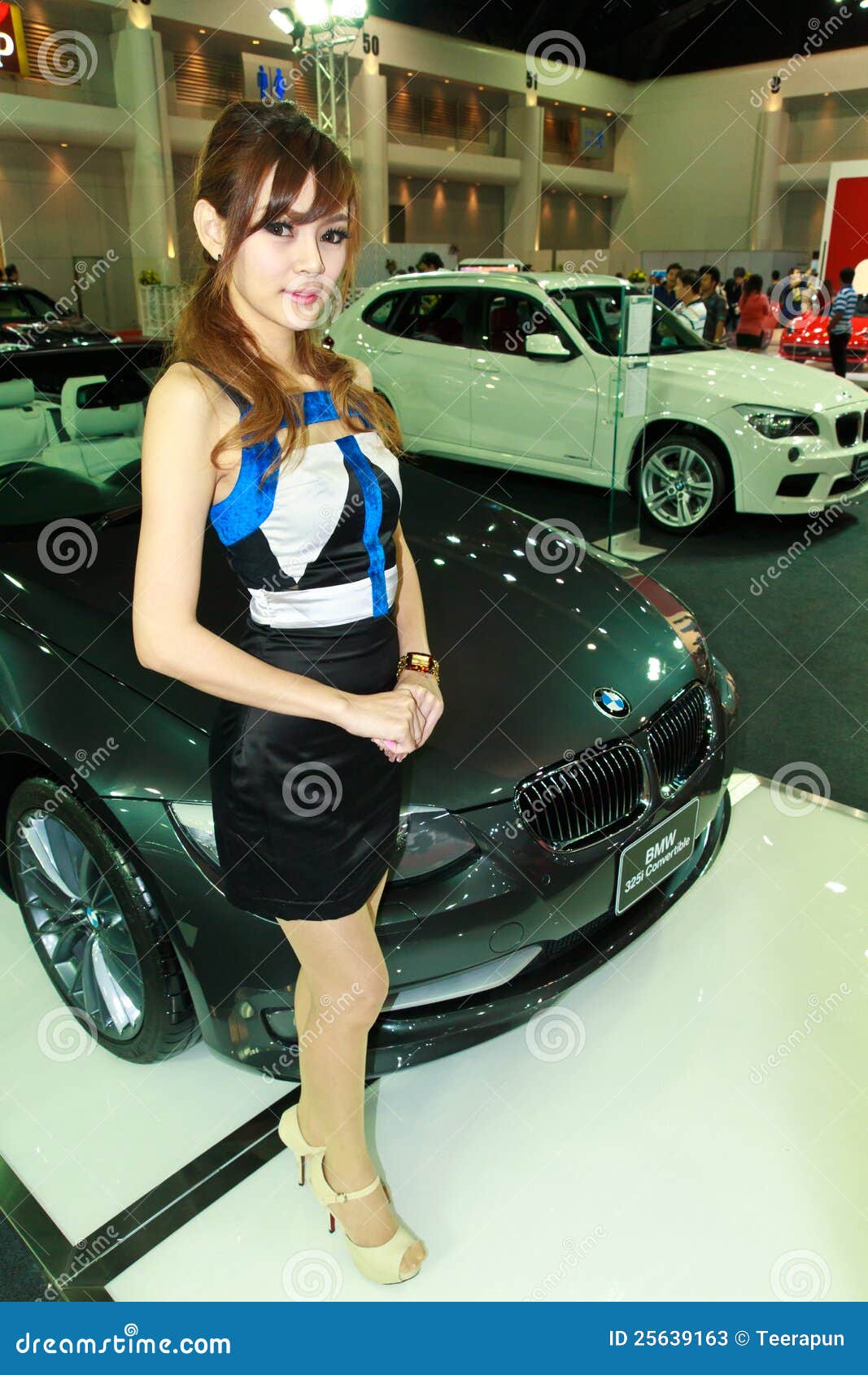 Female Presenter Of Toyota Editorial Photo | CartoonDealer.com #25638001