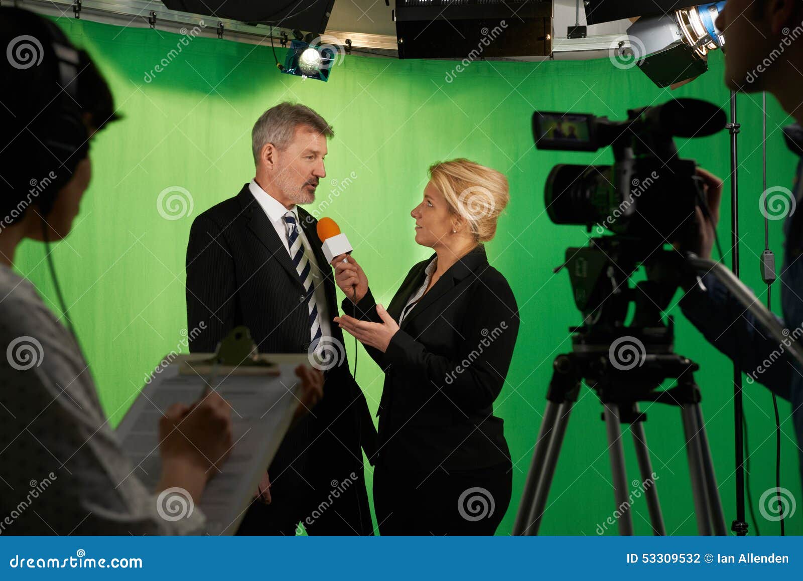 Female Presenter Interviewing in Television Studio with Crew in Stock ...