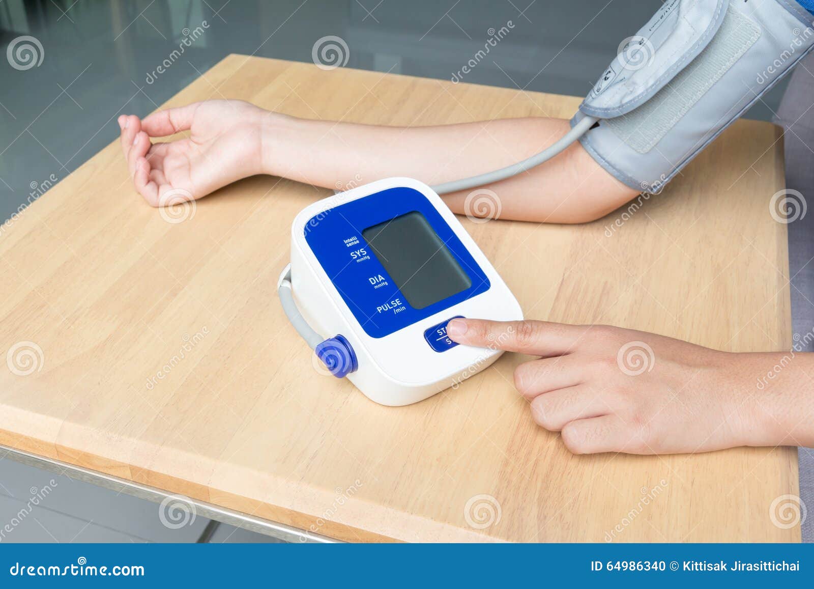 Female Press Start Button on Blood Pressure Stock Photo - Image of ...