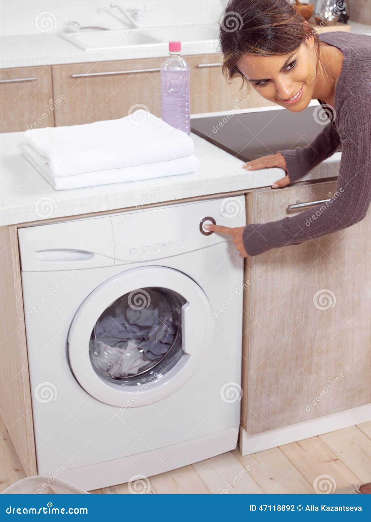 Female Pressing Button on Washing Machine Stock Photo - Image of face ...