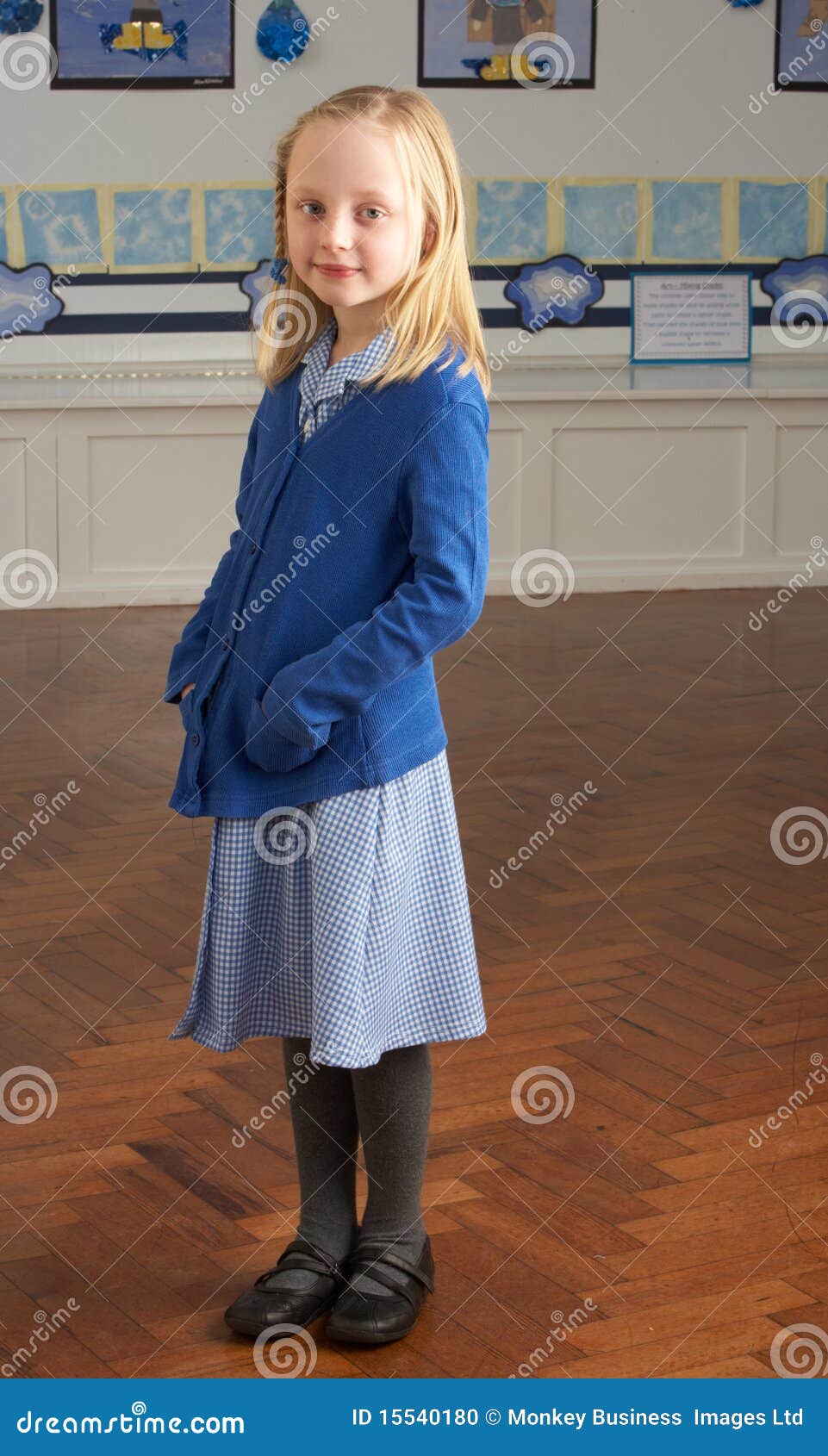 Female Primary School Pupil Standing in Classroom Stock Photo - Image ...