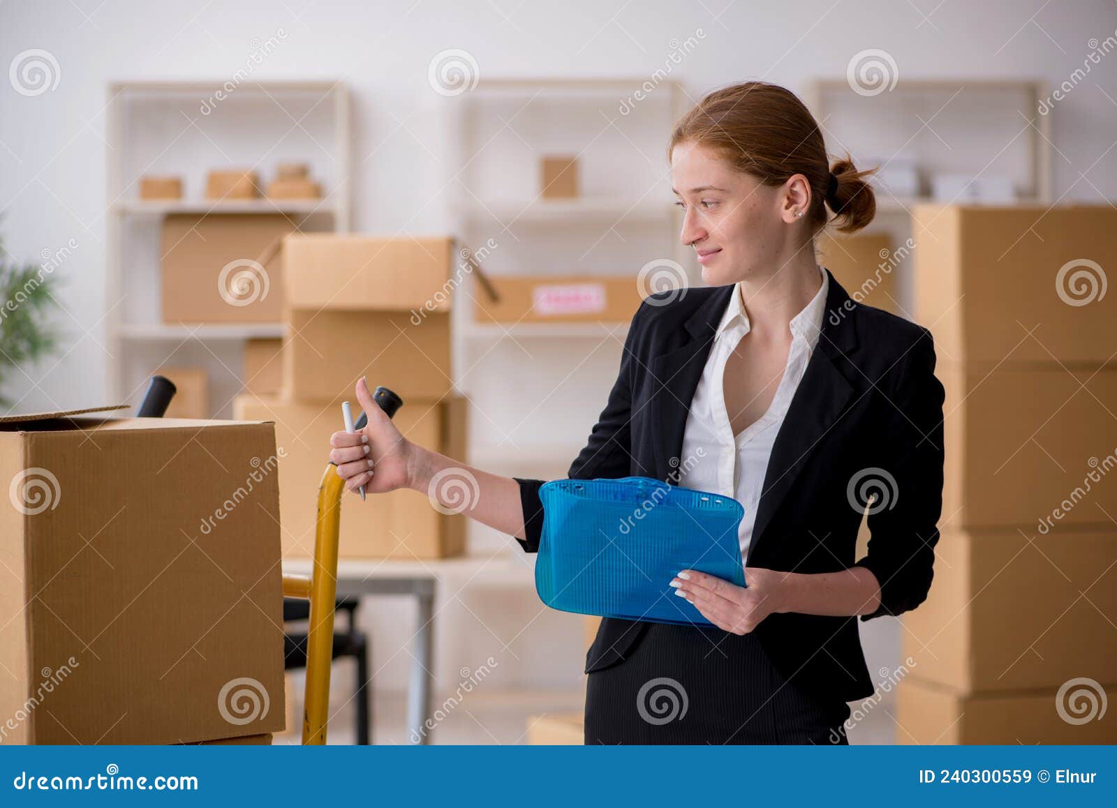 Young Female Professional Mover Doing Home Relocation Stock Image ...