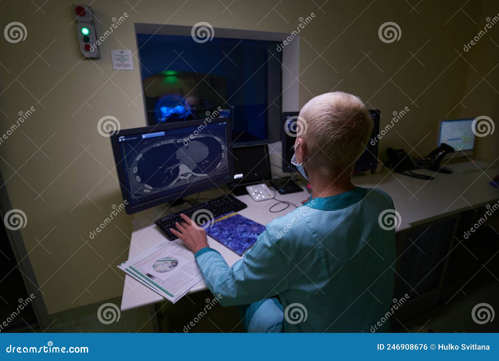 Doctor Using Computer during MRI of Male Patient Stock Photo - Image of ...