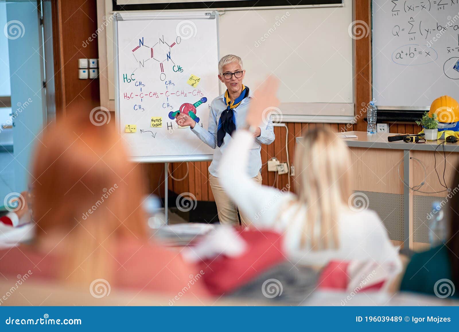 Female Professor Answering the Student Question Stock Image - Image of ...