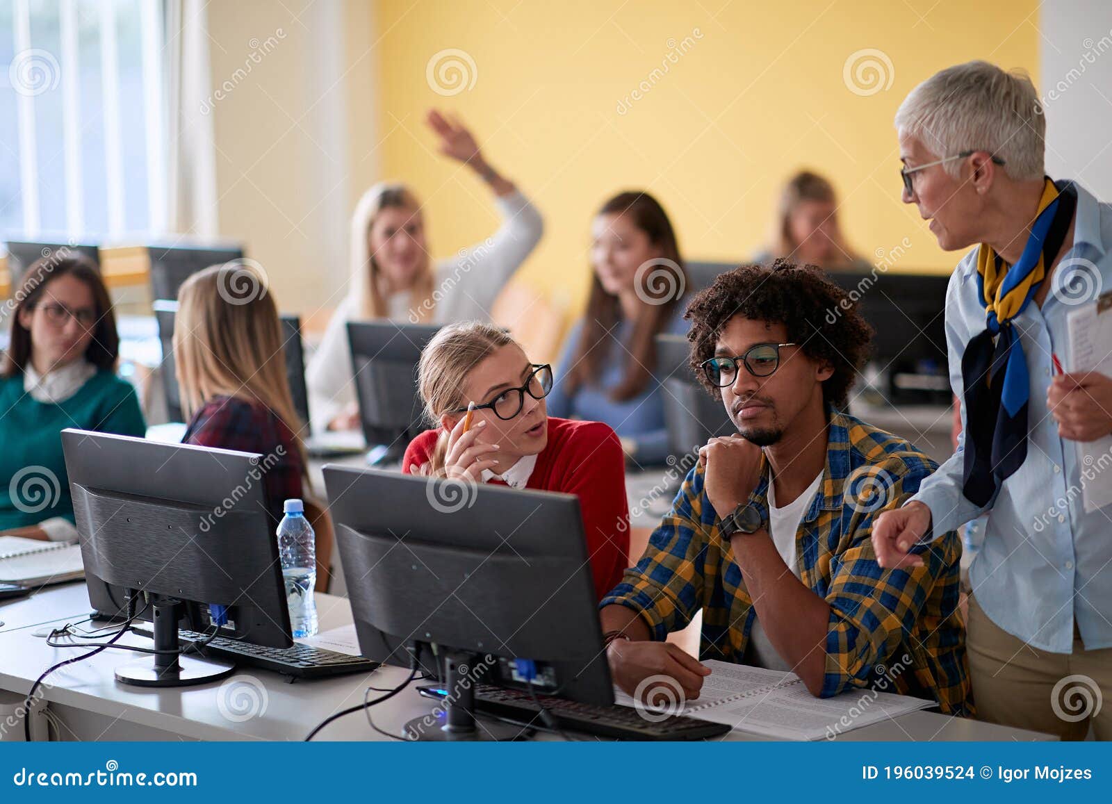 Female Professor Answering the Student Question at an Informatics ...