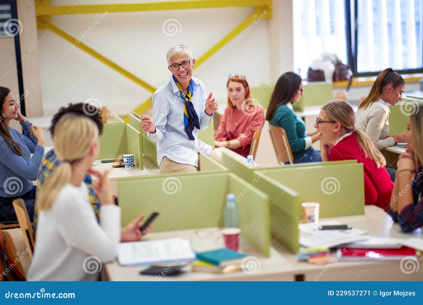 Female Professor Enjoying in a Discussion with Students Stock Image ...