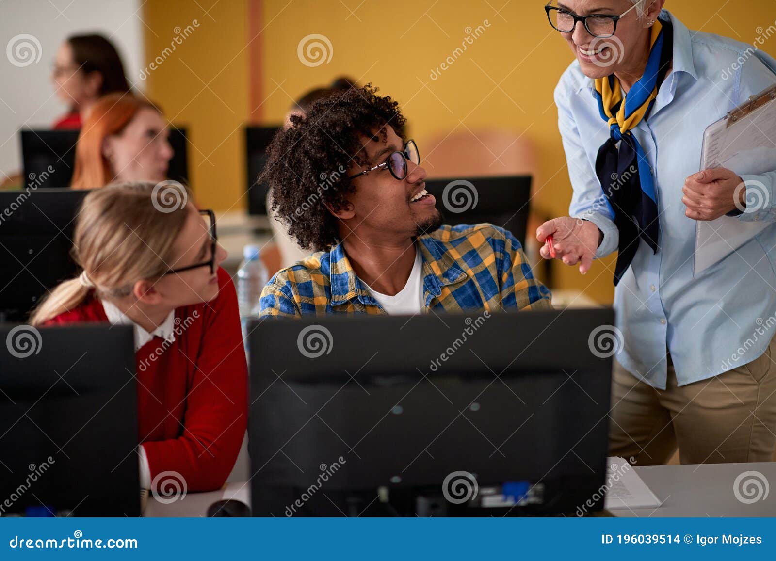Female Professor Explaining an Informatics Lesson To the Students Stock ...