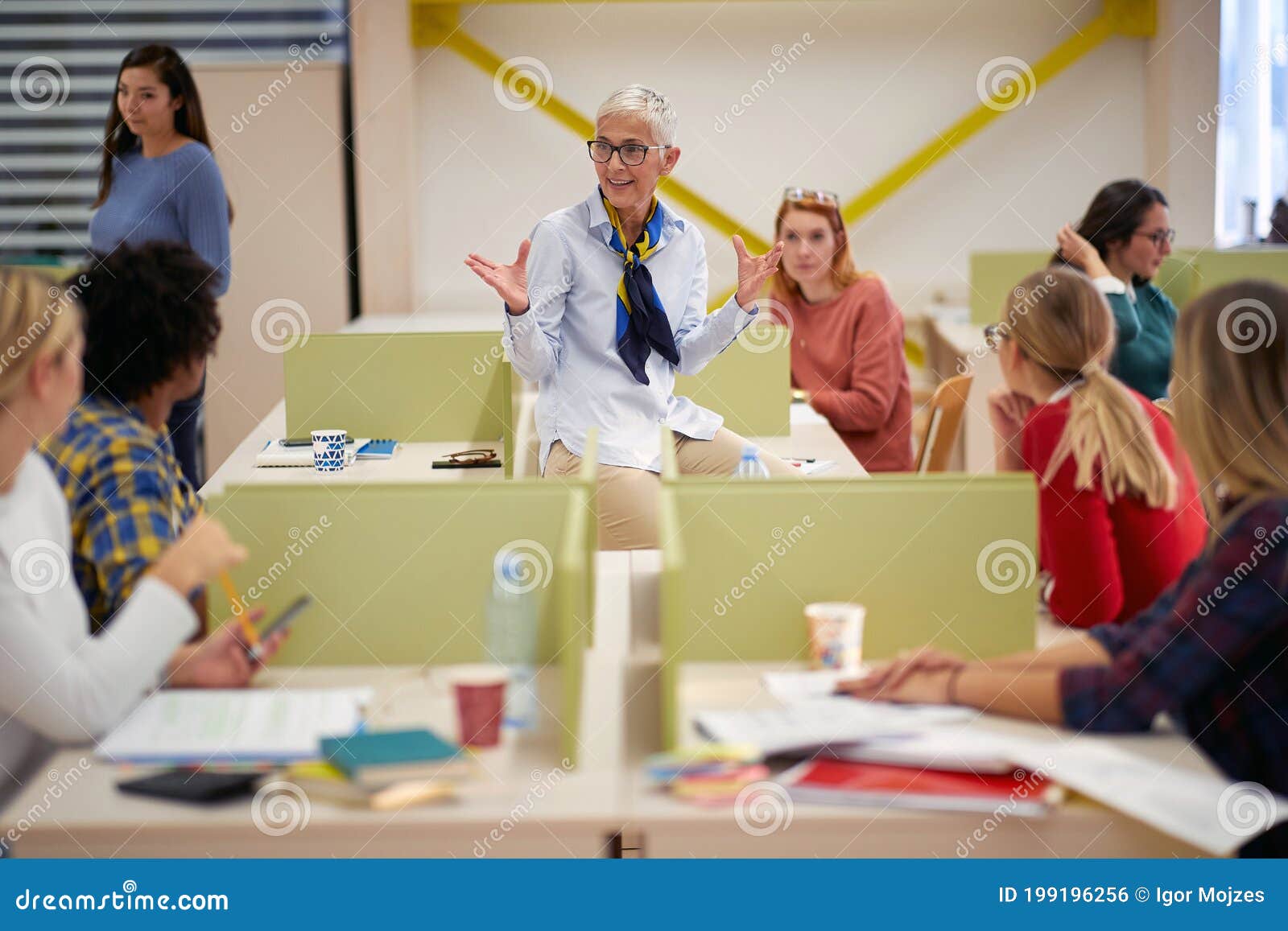 Female Professor Explaining the Lesson To Students at a Lecture Stock ...