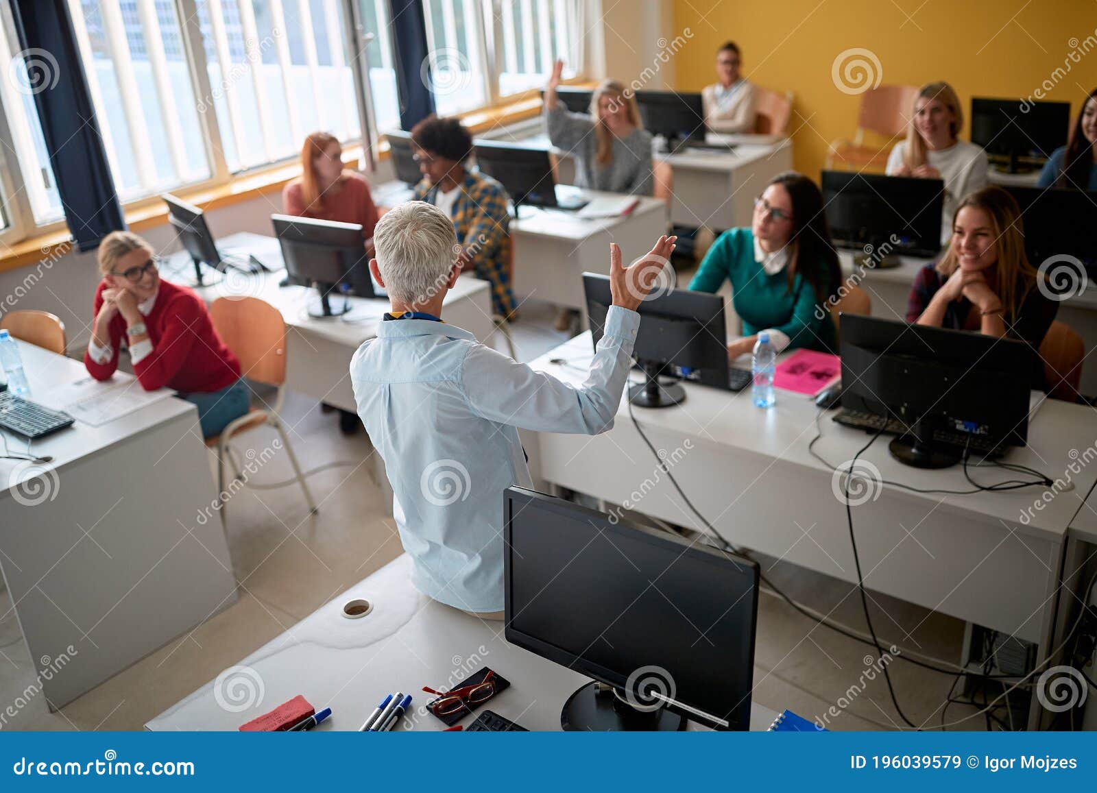 Female Professor Explaining Student`s Questions at an Informatics ...