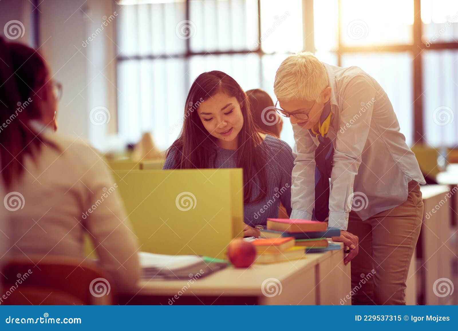 Female Professor Helping Female Student about the Lesson Stock Image ...