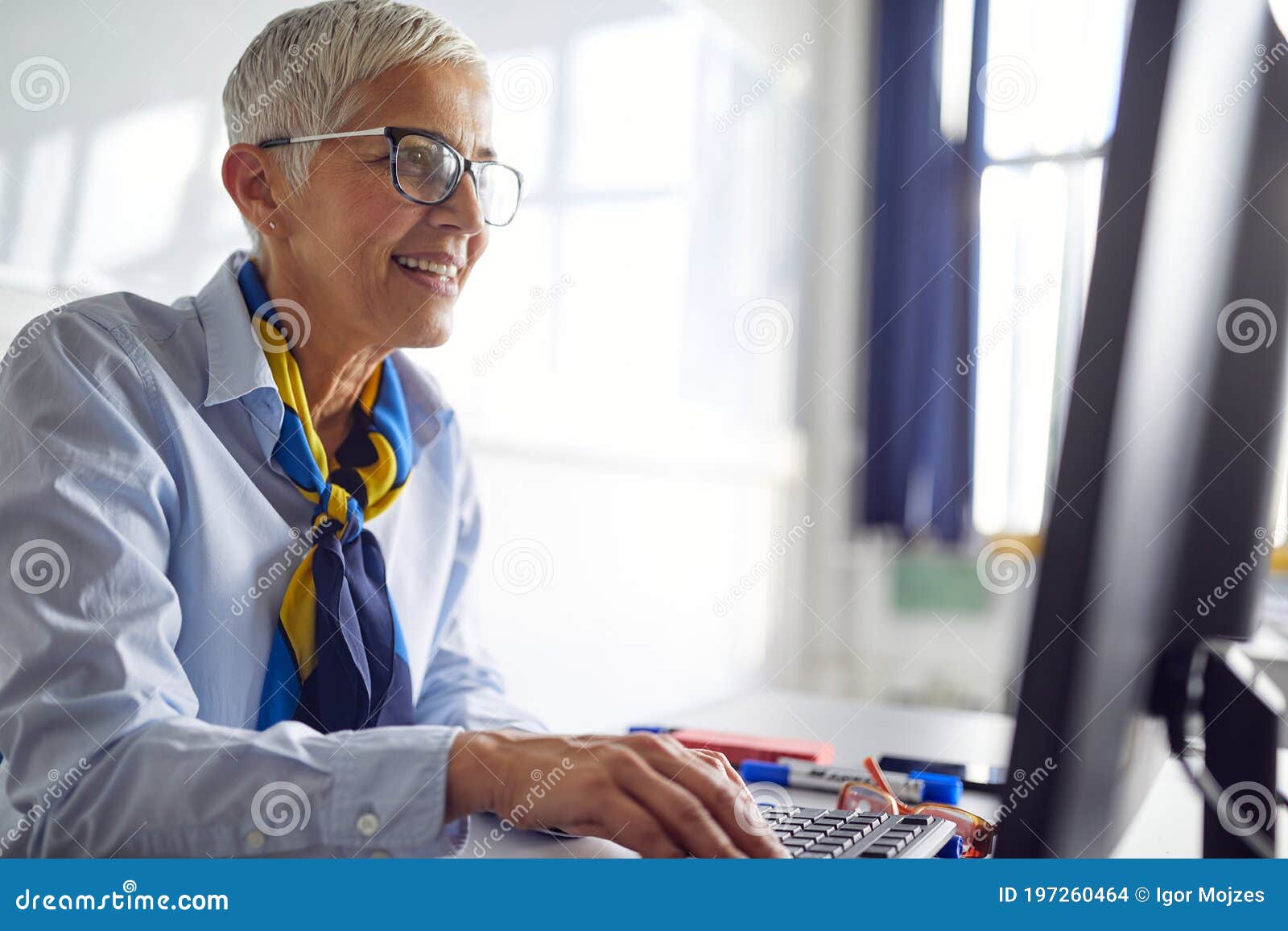 Female Professor in the Lecture Break Working on the Computer Stock ...