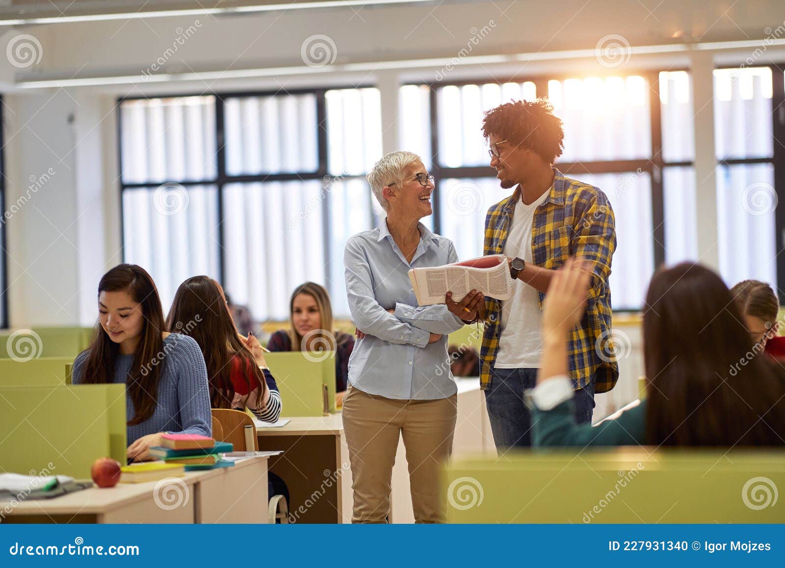 Female Professor Likes Student Interest in the Lesson at the Lecture ...