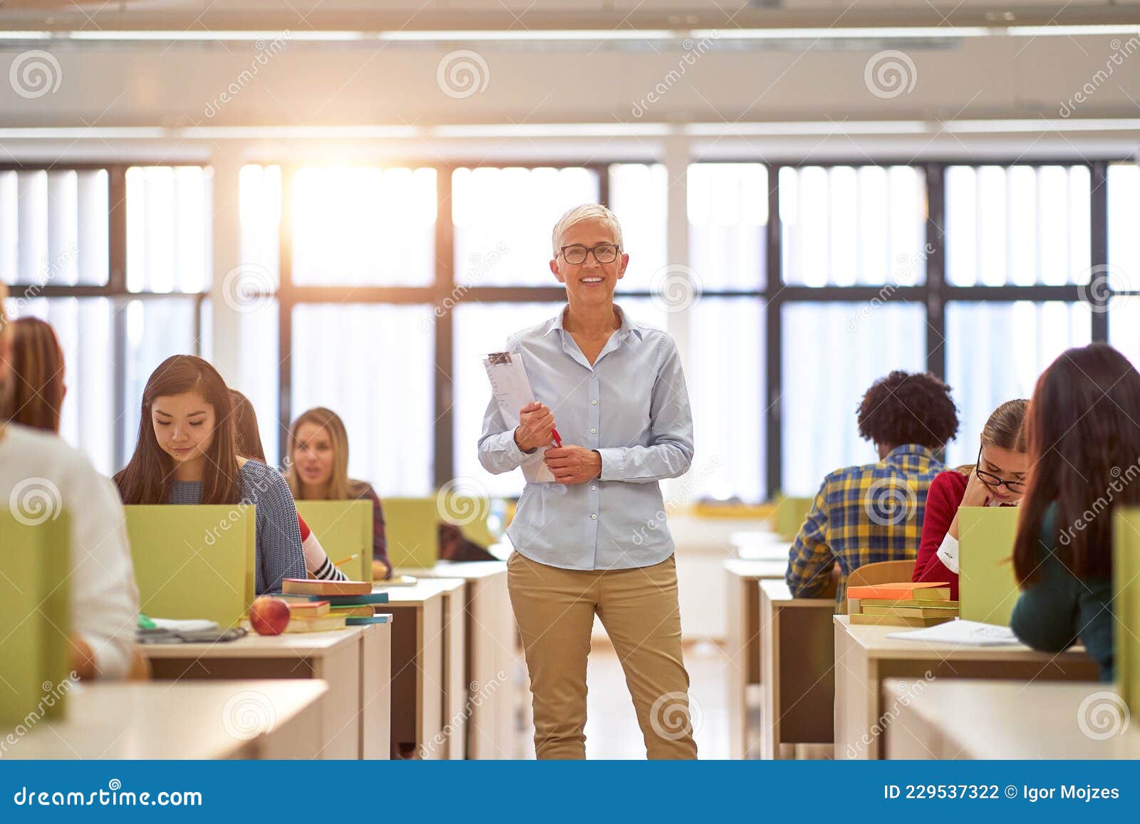 Female Professor and Students at the Lecture Stock Photo - Image of ...