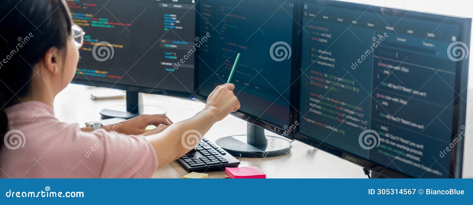 Female Programer Explain while Pointing Code Displayed on Computer. Burgeoning. Stock Image ...