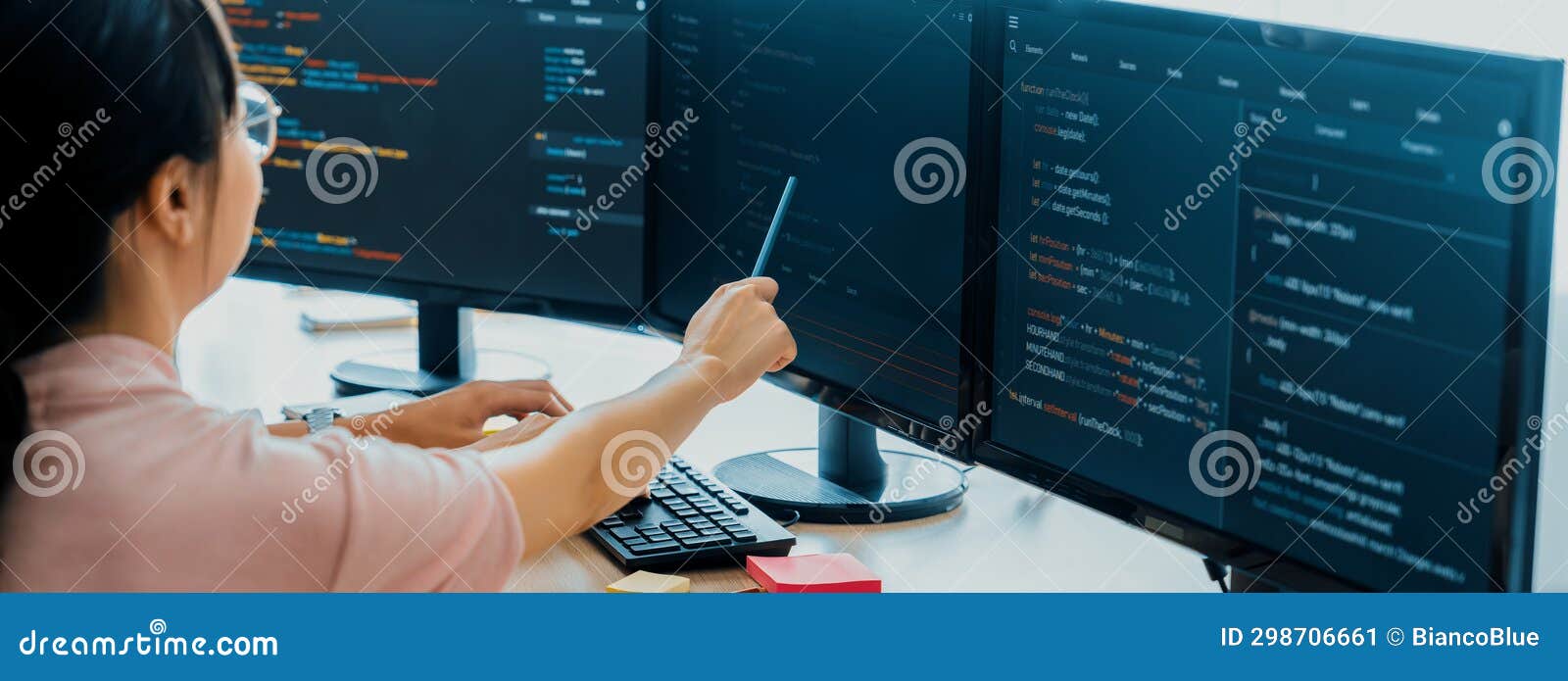 Female Programer Explain while Pointing Code Displayed on Computer. Burgeoning. Stock Image ...
