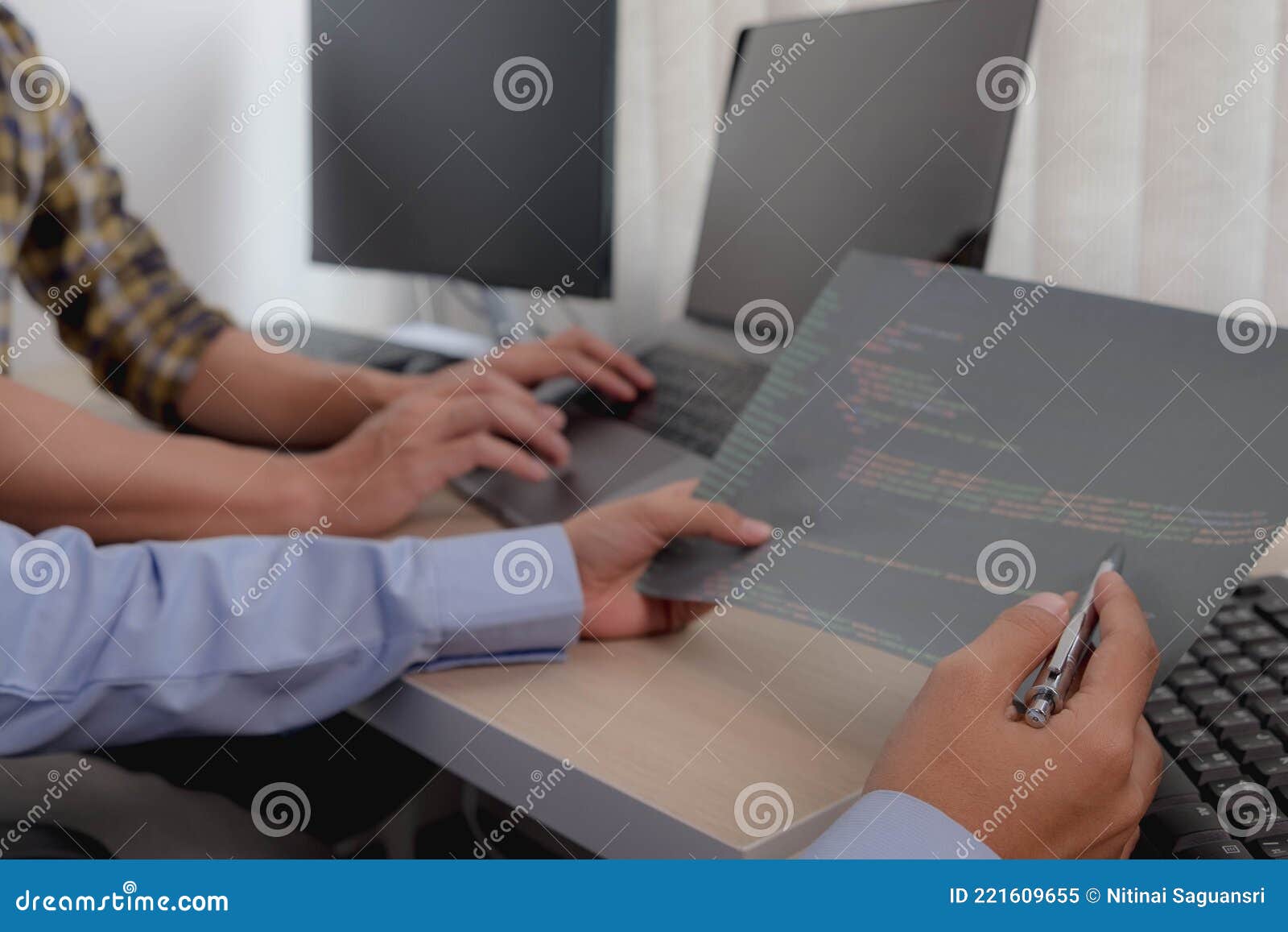 Female Programmer Working On A Computer Planning A Program In An Office