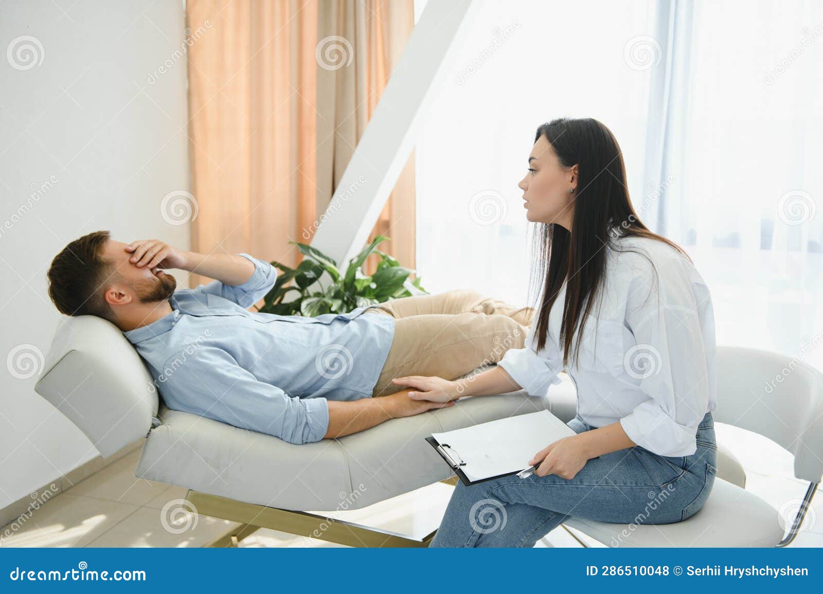 Female Psychologist Making Note while Patient Talking Stock Photo ...