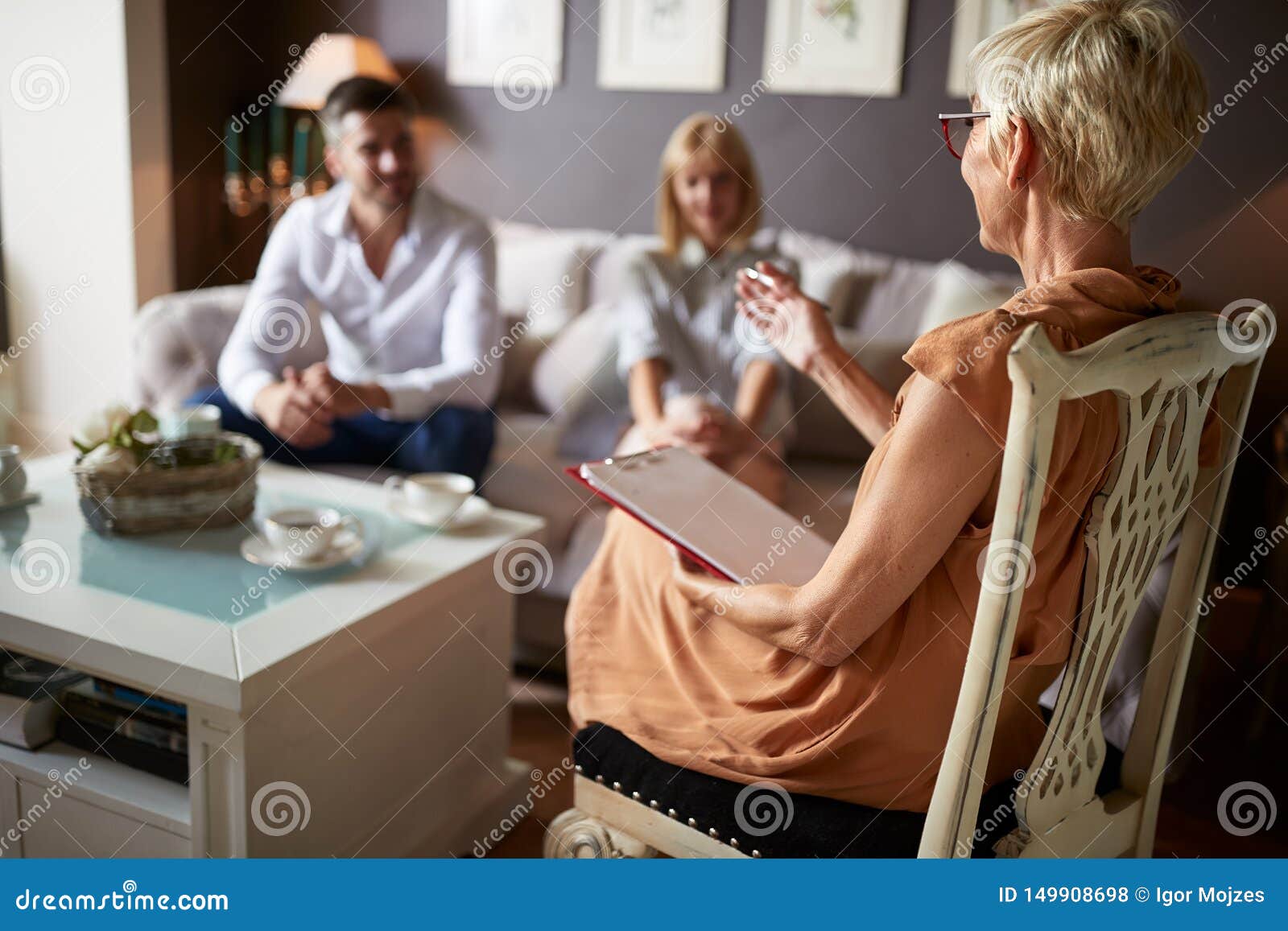 Female Psychologist at Workplace with Couple Stock Photo - Image of ...