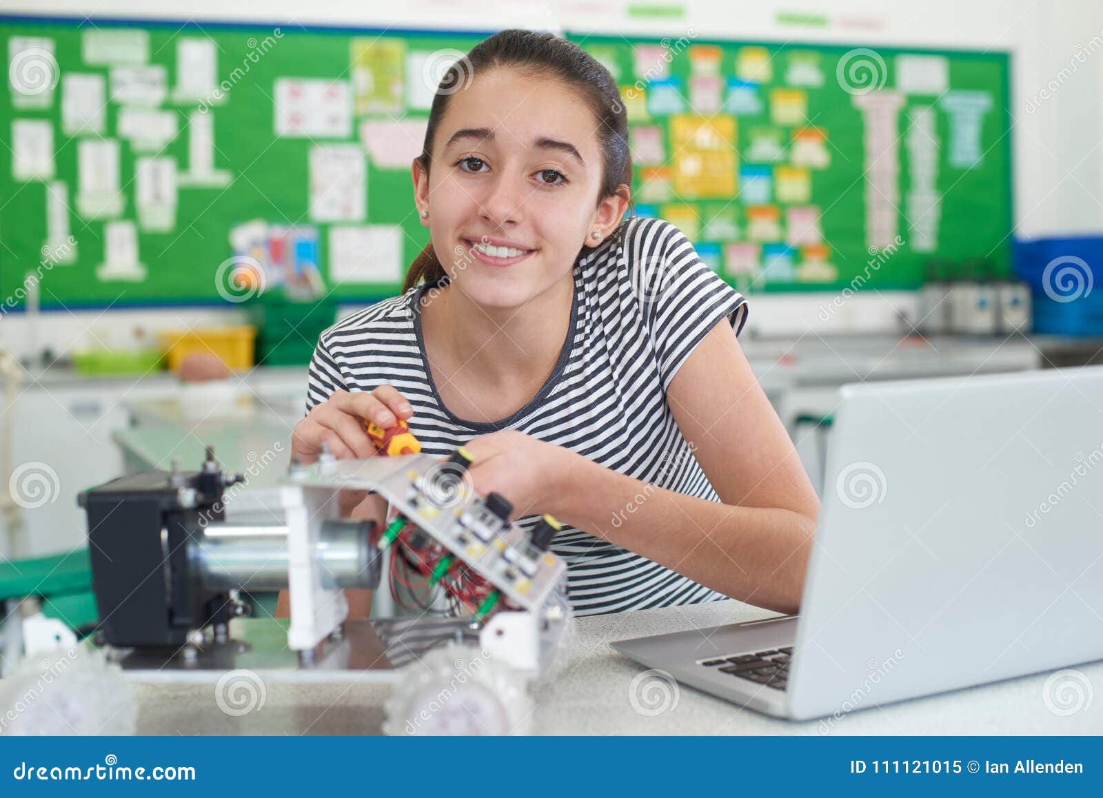 Portrait of Female Pupil Studying Robotics in Science Lesson Stock ... Portrait of Female Pupil Studying Robotics in Science Lesson Stock ...