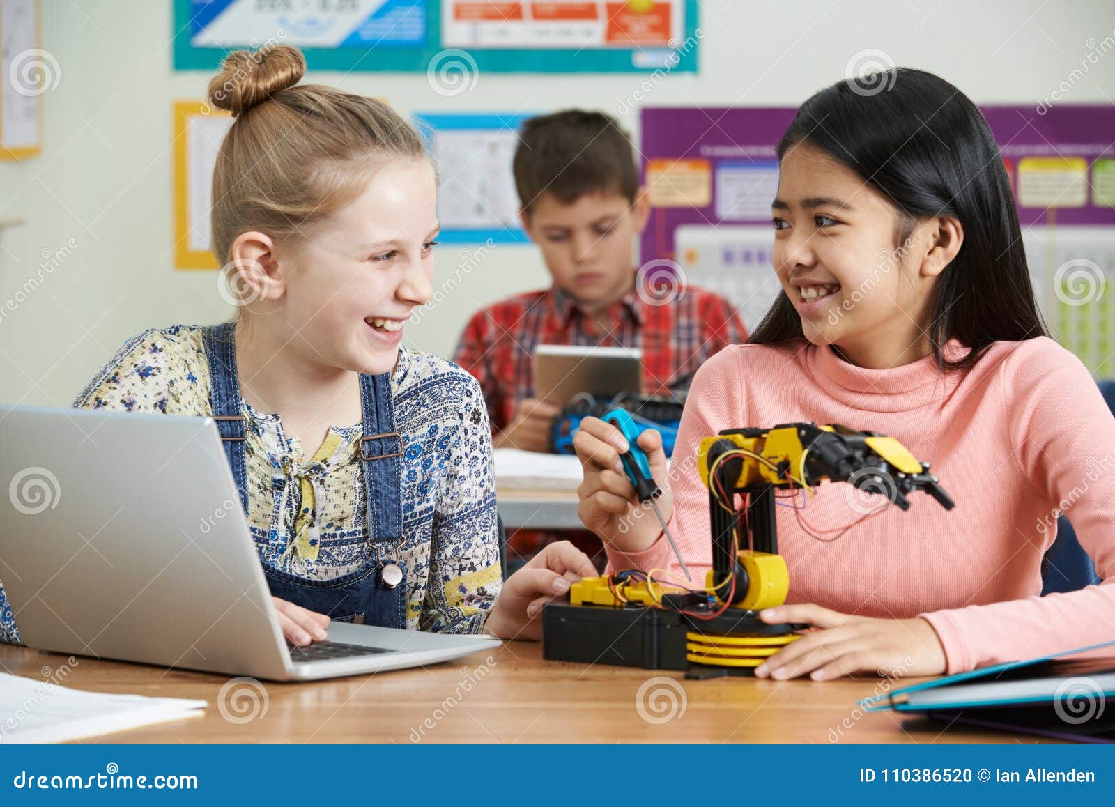 Two Female Pupils in Science Lesson Studying Robotics Stock Photo ...