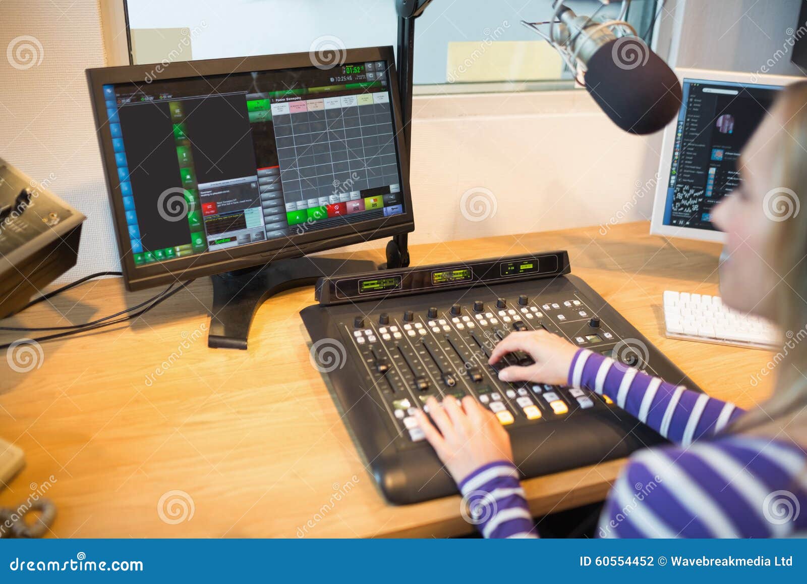 Female Radio Host in Front of Screen Operating Sound Mixer Stock Photo ...