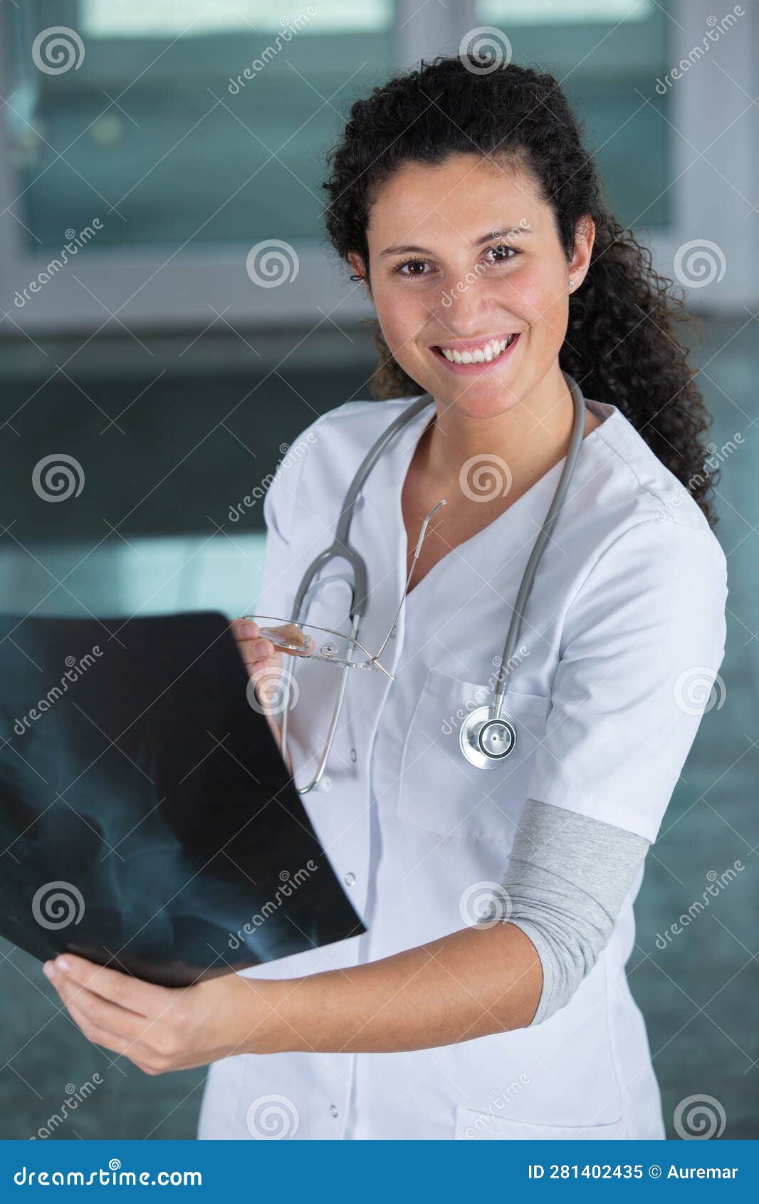 Female Radiologist Holding X-ray Stock Image - Image of medicalperson ...