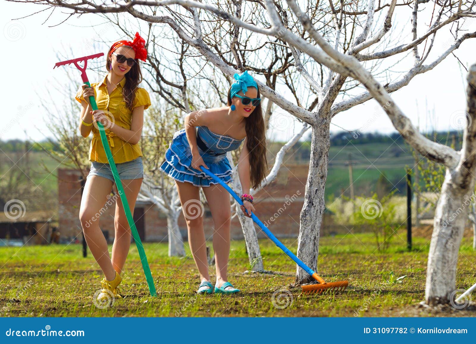 Female Raking Soil on Garden Stock Photo - Image of happiness ...