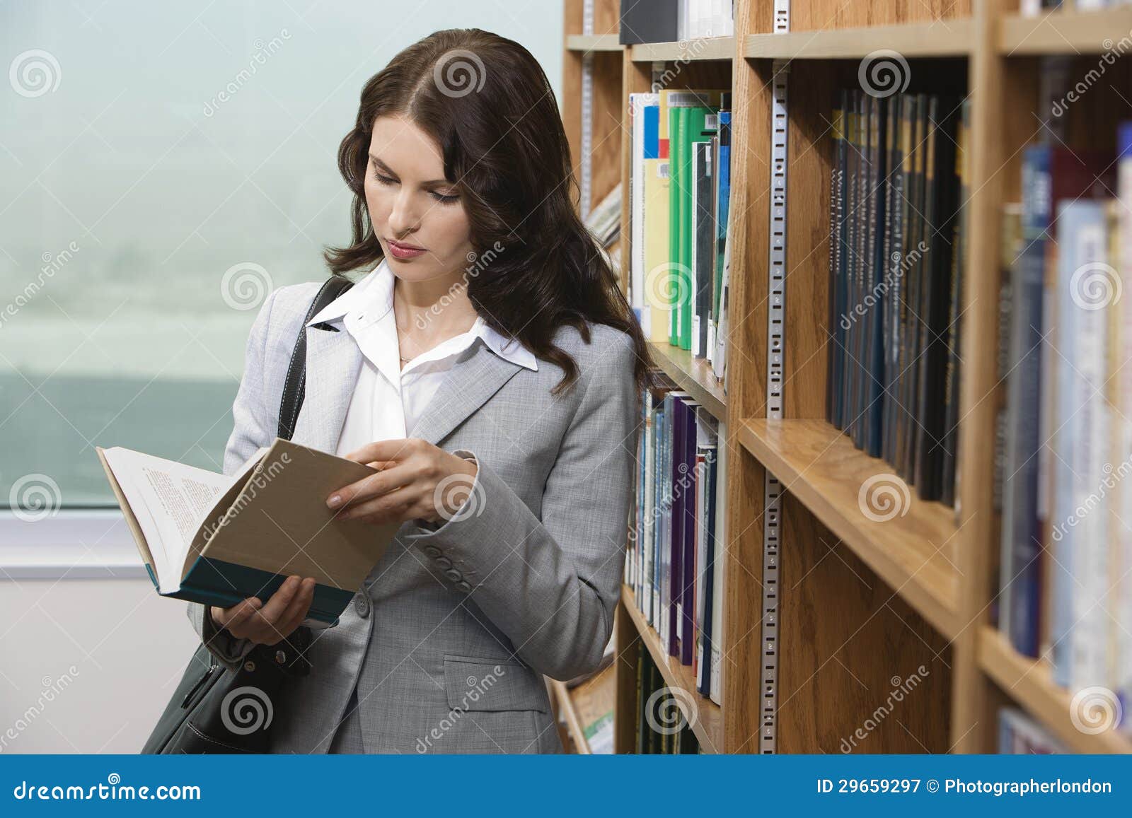 Female Reading Book in Library Stock Image - Image of professor, book ...