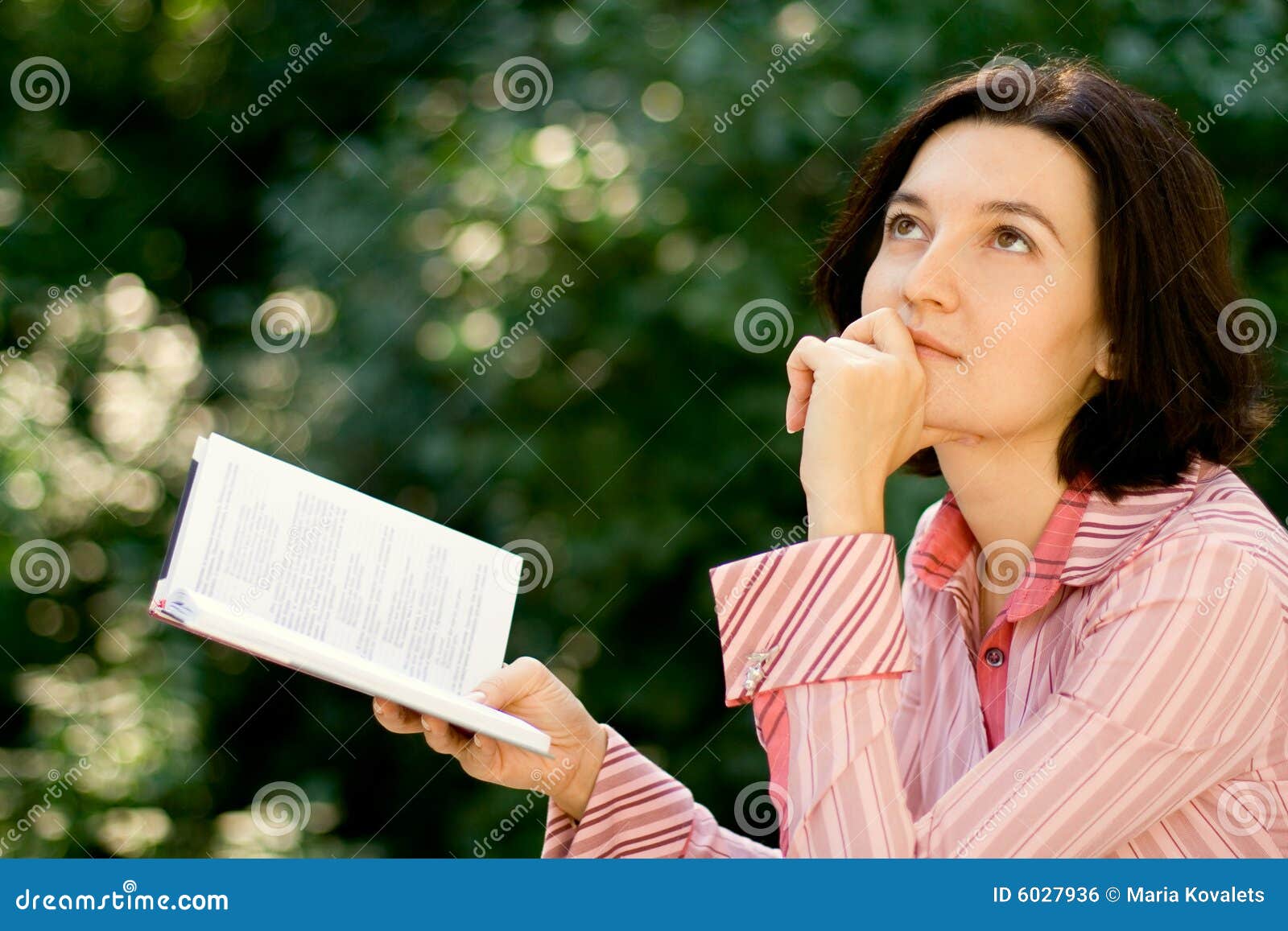 Female reading in park stock photo. Image of outdoor, face - 6027936