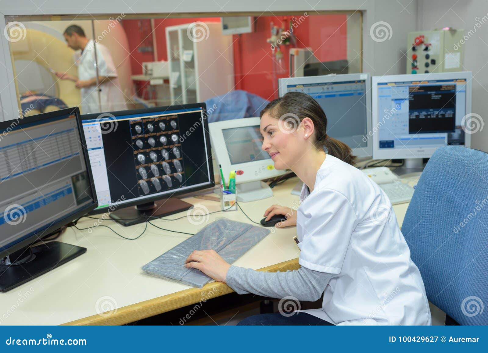 Female Receptionist Working in Hospital Stock Image - Image of family ...