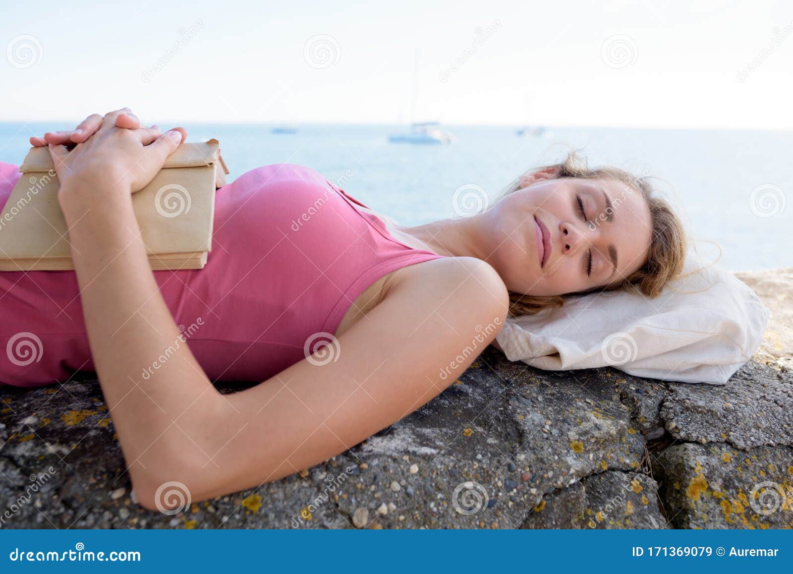 Female Relaxing and Sleeping on Beach Stock Image - Image of bridge ...