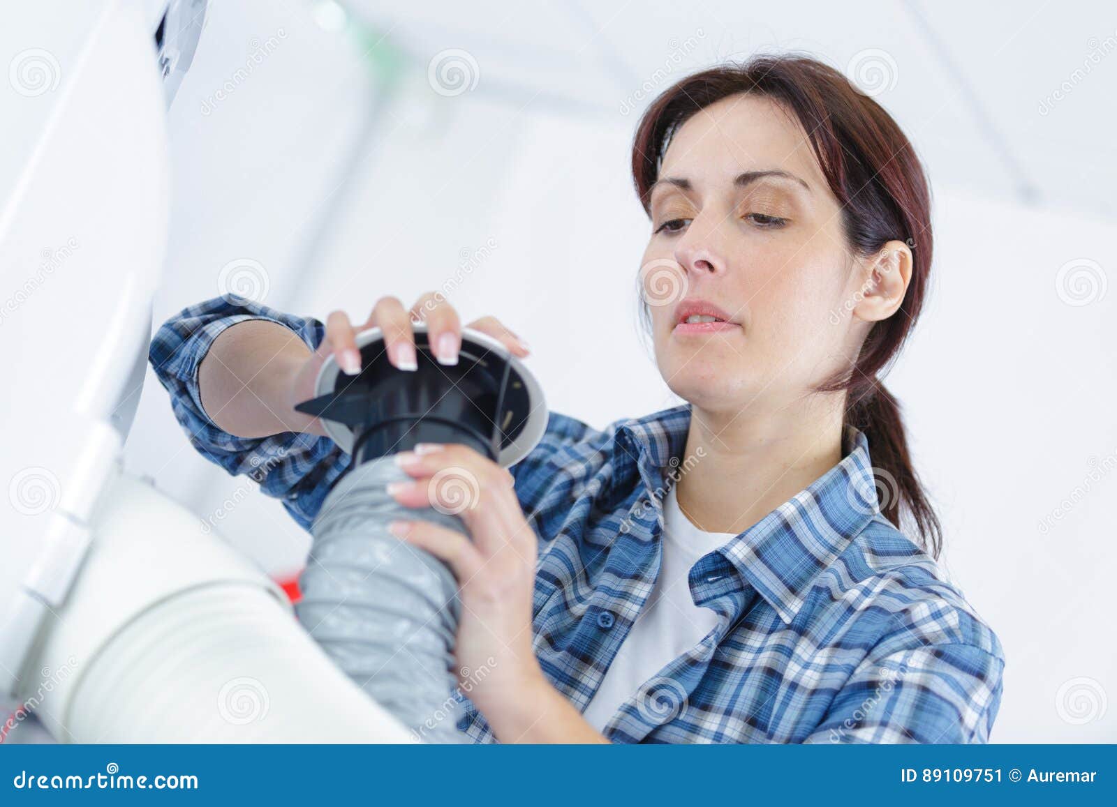 Female Repairer Fixing Broken Ventilation Stack Stock Image - Image of ...
