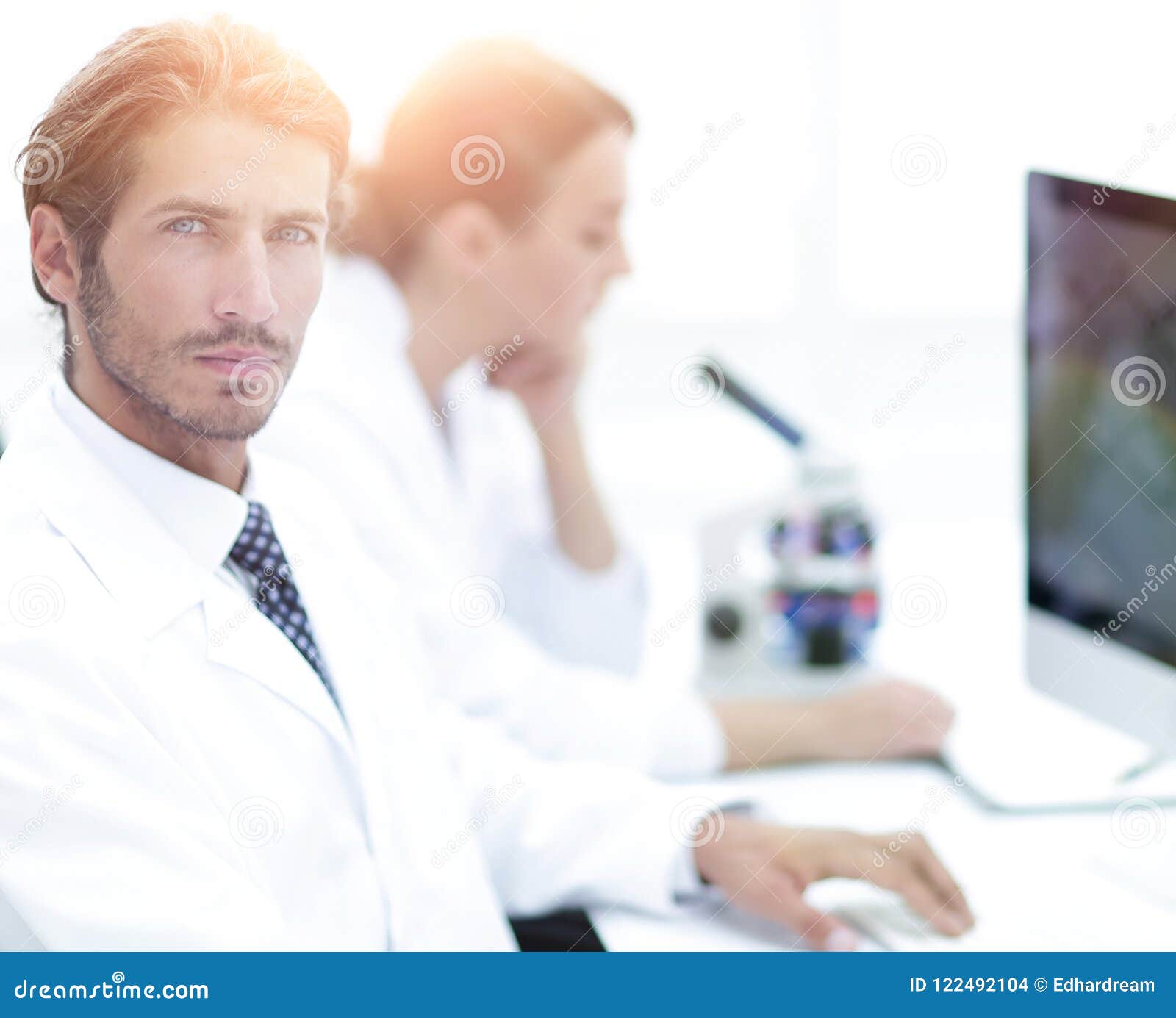 Young Male Technician Working on Computer in Laboratory Stock Photo ...
