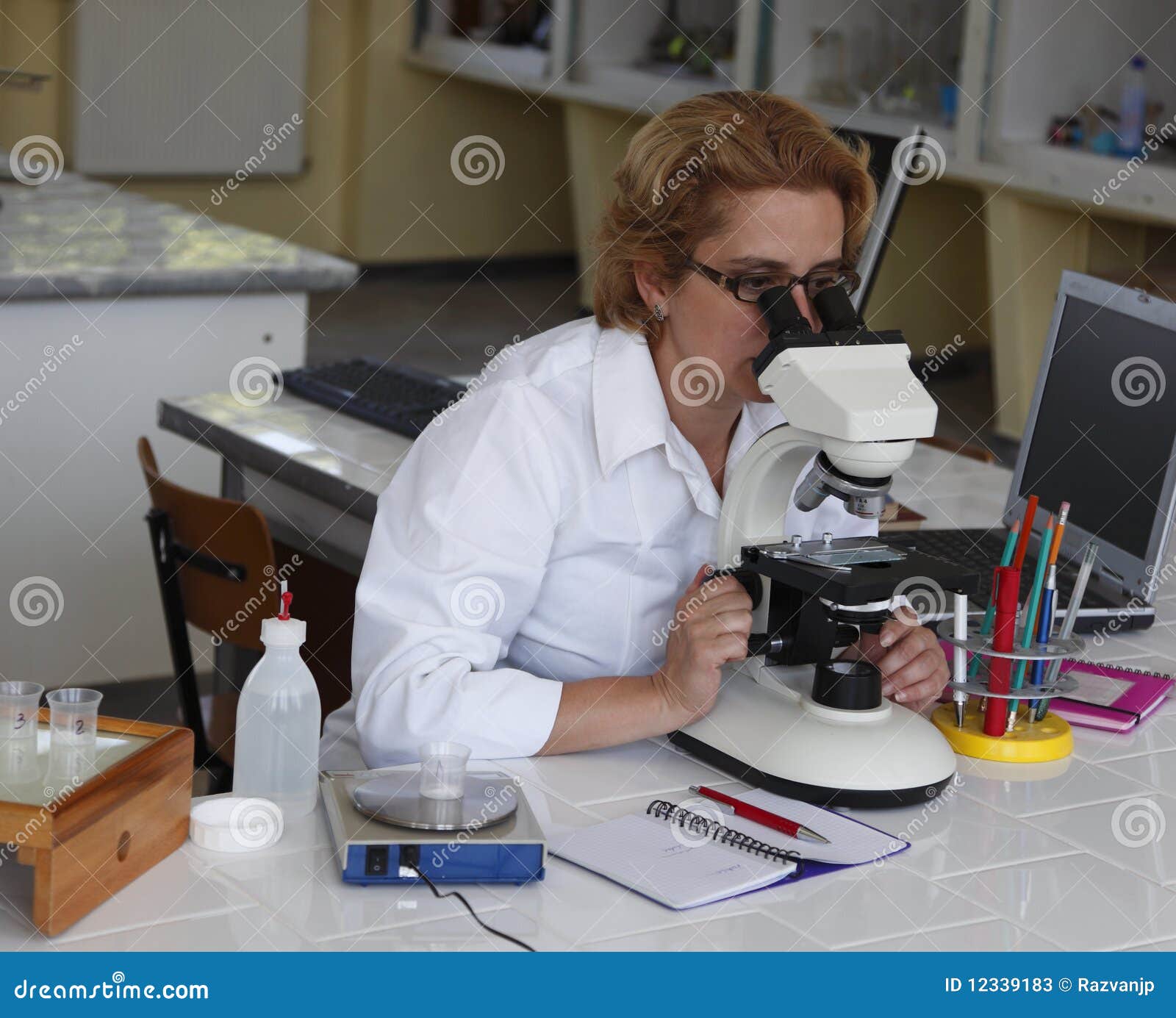Female researcher stock image. Image of assistant, microscope - 12339183