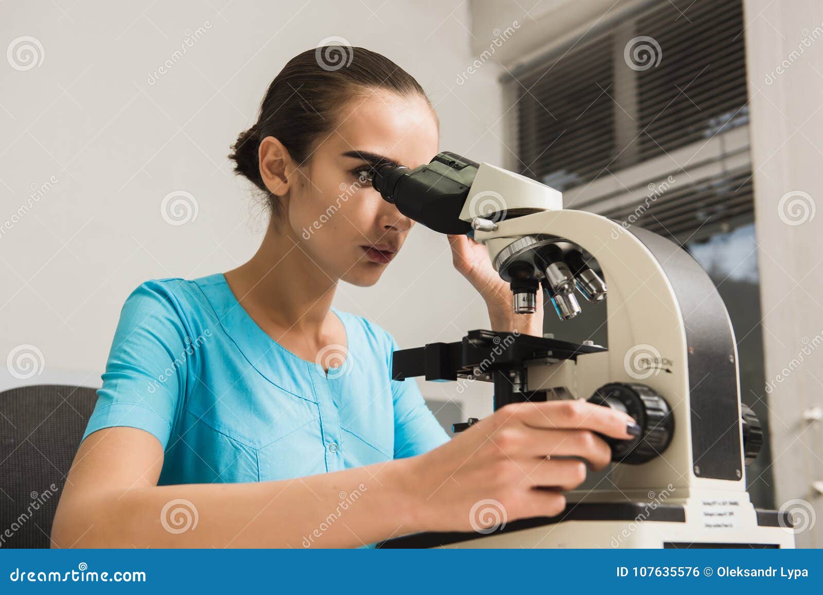 Female Researcher with a Microscope Stock Photo - Image of instrument ...