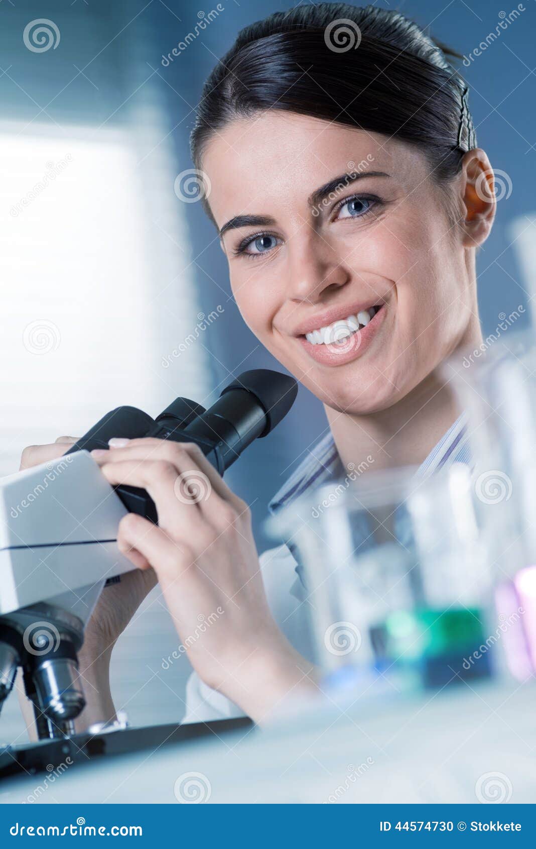 Female researcher smiling stock photo. Image of microscope - 44574730