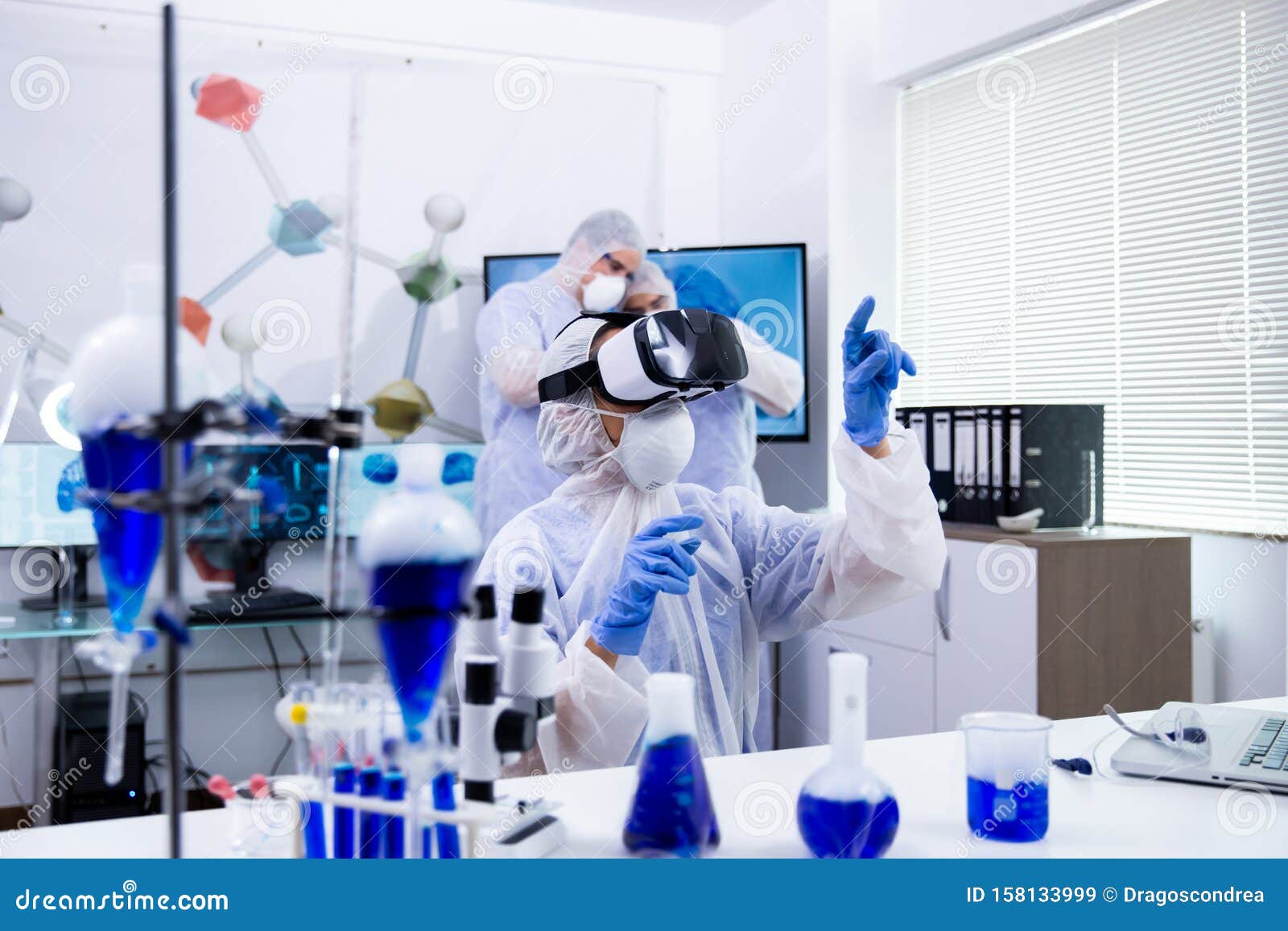 Female Researcher Using Virtual Reality Goggles in Her Experimental ...