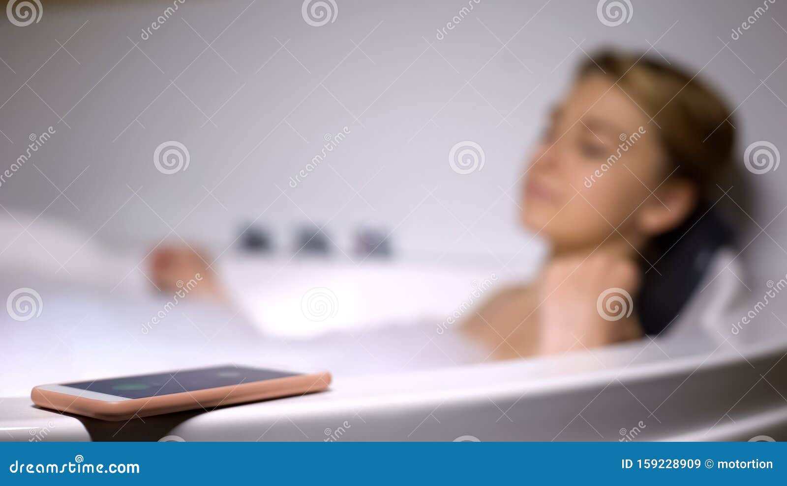 Female Resting In Bath Smartphone Calling Device Lying On Corner Of
