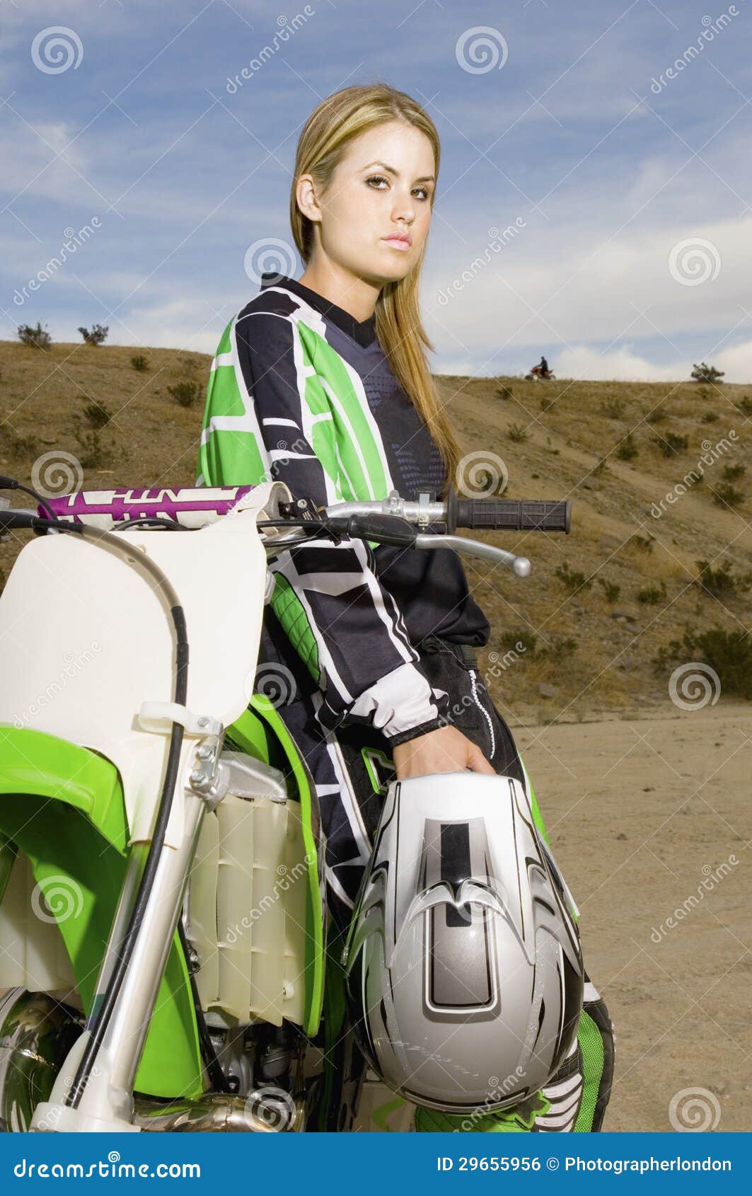 Female Rider with Helmet at Track Stock Photo - Image of attitude ...