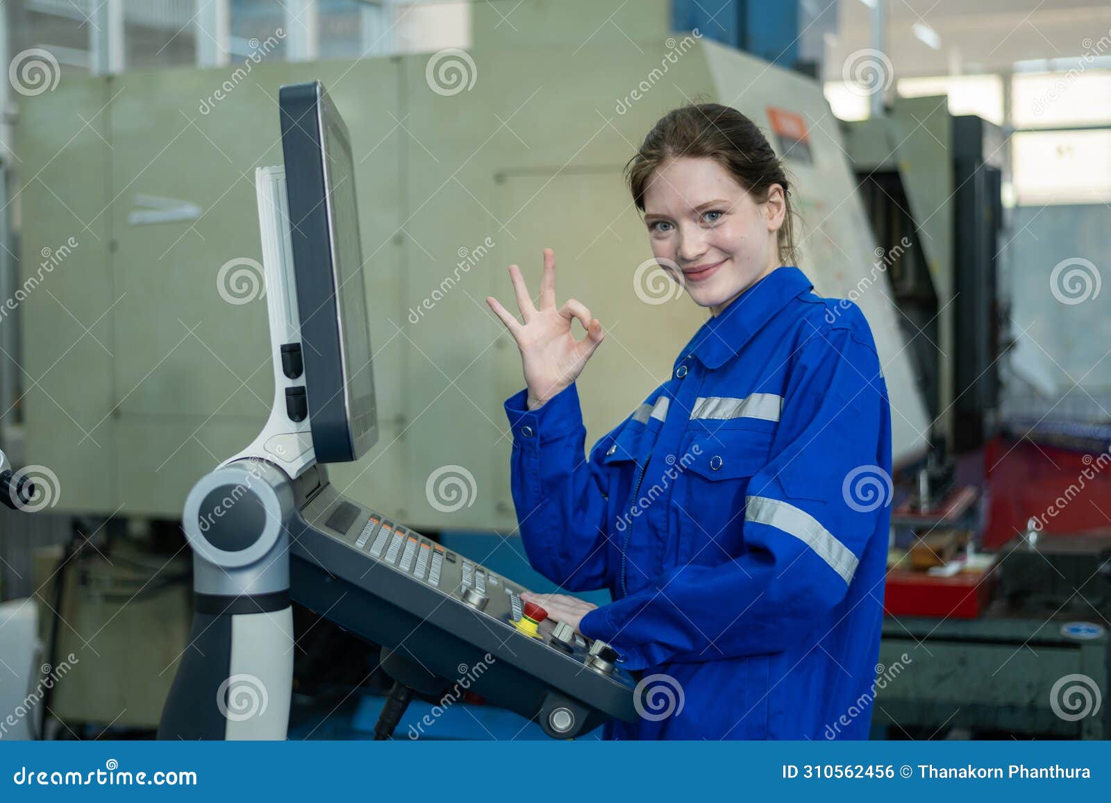 Female Robotics Engineers Using Controller To Remotely Operate Programming and Manipulating ...