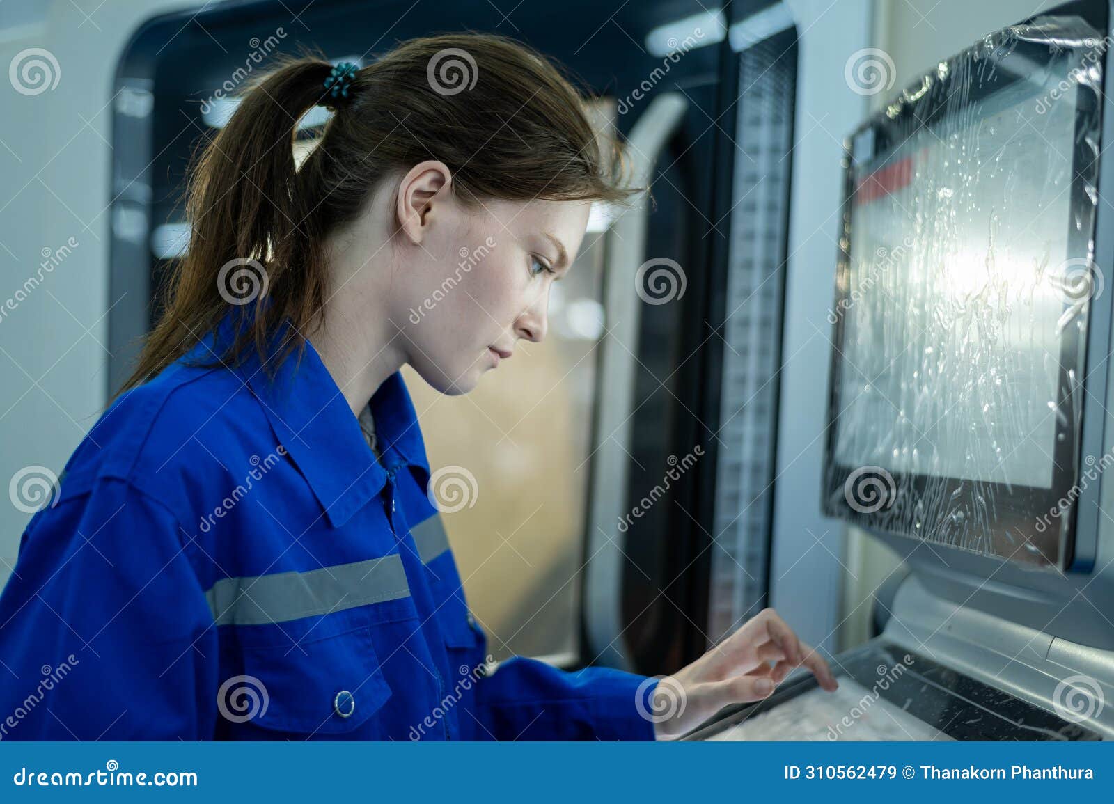 Female Robotics Engineers Using Controller To Remotely Operate ...