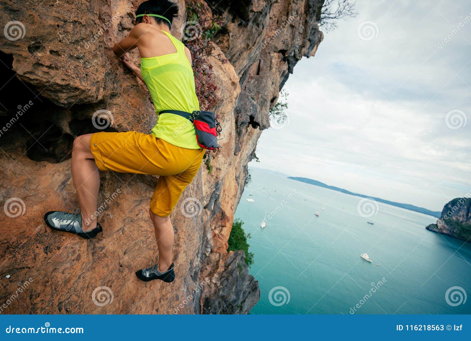 Rock Climber Climbing on Seaside Cliff Stock Image - Image of ...
