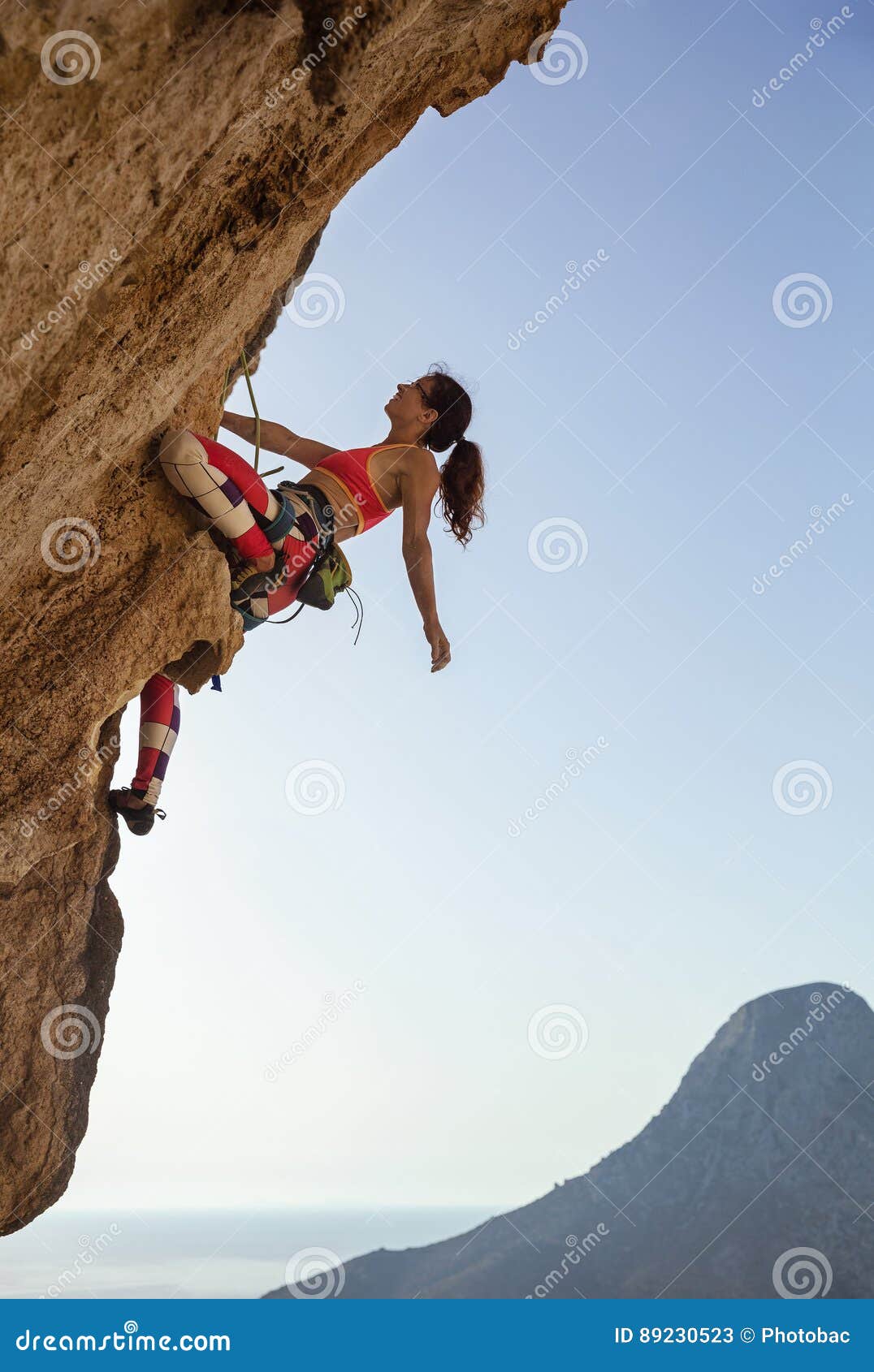 Female Rock Climber Looking Up at Challenging Route Stock Image - Image ...