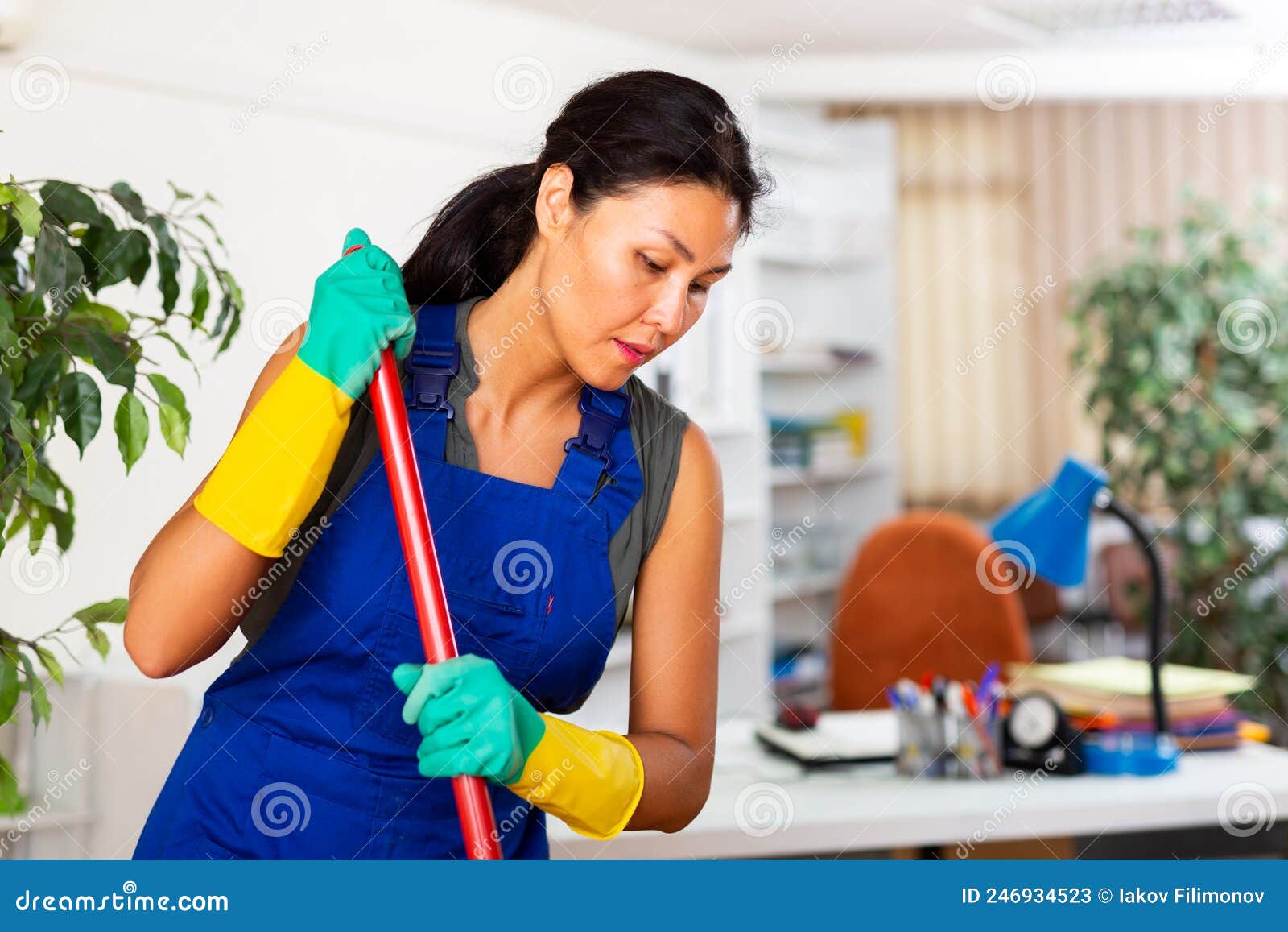 Female Room Cleaner Sweeping Floor in Modern Office Stock Image - Image ...