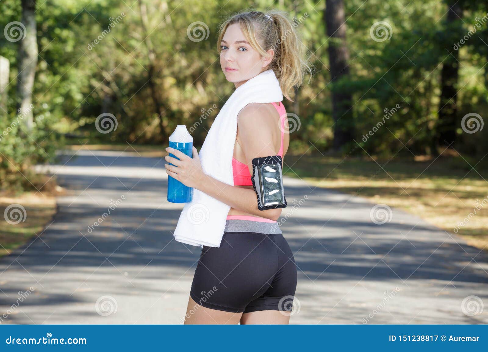 Female Runner Looking Back Over Shoulder Stock Image - Image of people ...