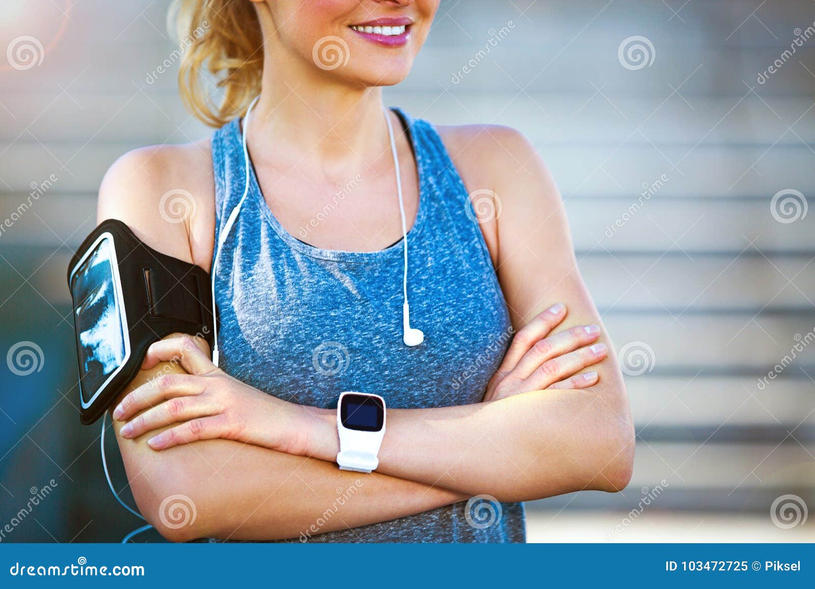Female Runner with Mobile Phone and Smart Watch Stock Image - Image of ...